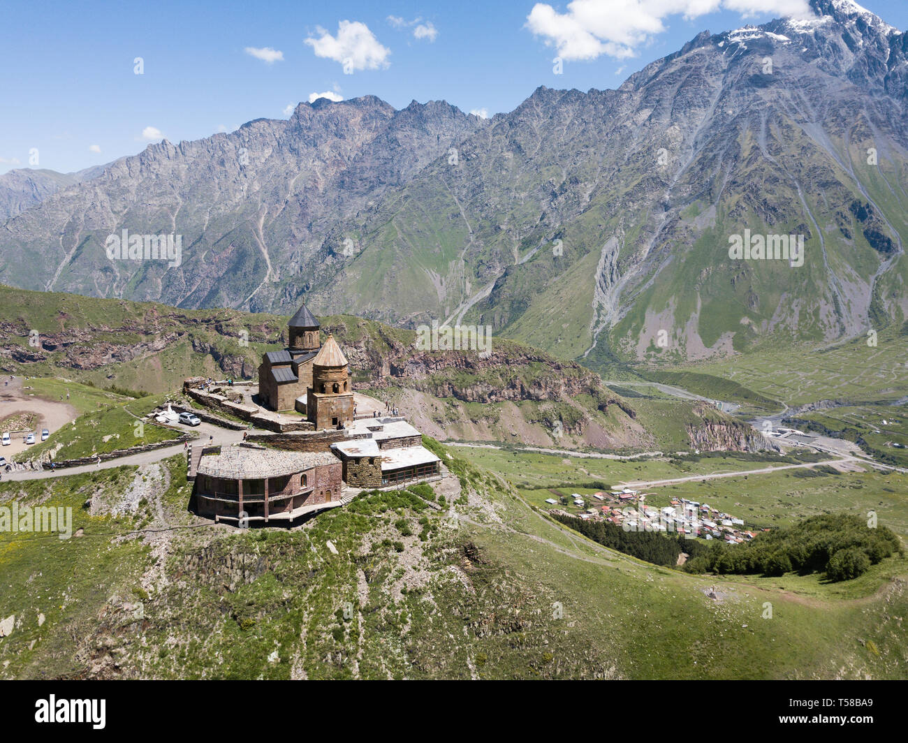 Aerial view to Gergeti Trinity Church or Tsminda Sameba, Holy Trinity ...