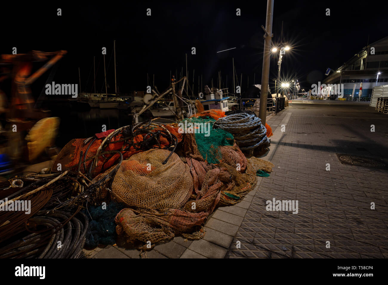 Ropes and fishing nets at the Old Port of Jaffa during night time ...