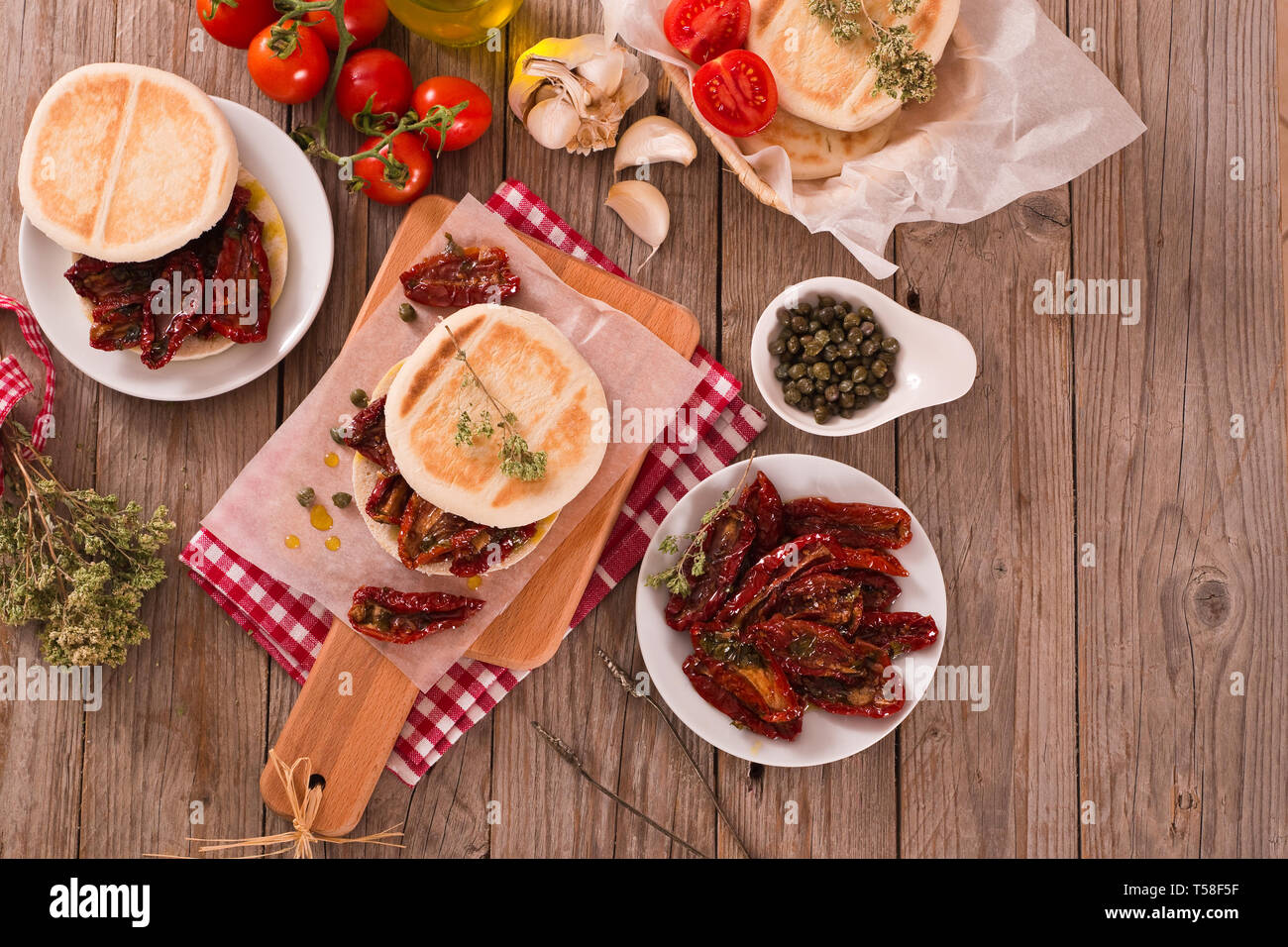 Tigella bread with sun-dried tomatoes Stock Photo - Alamy