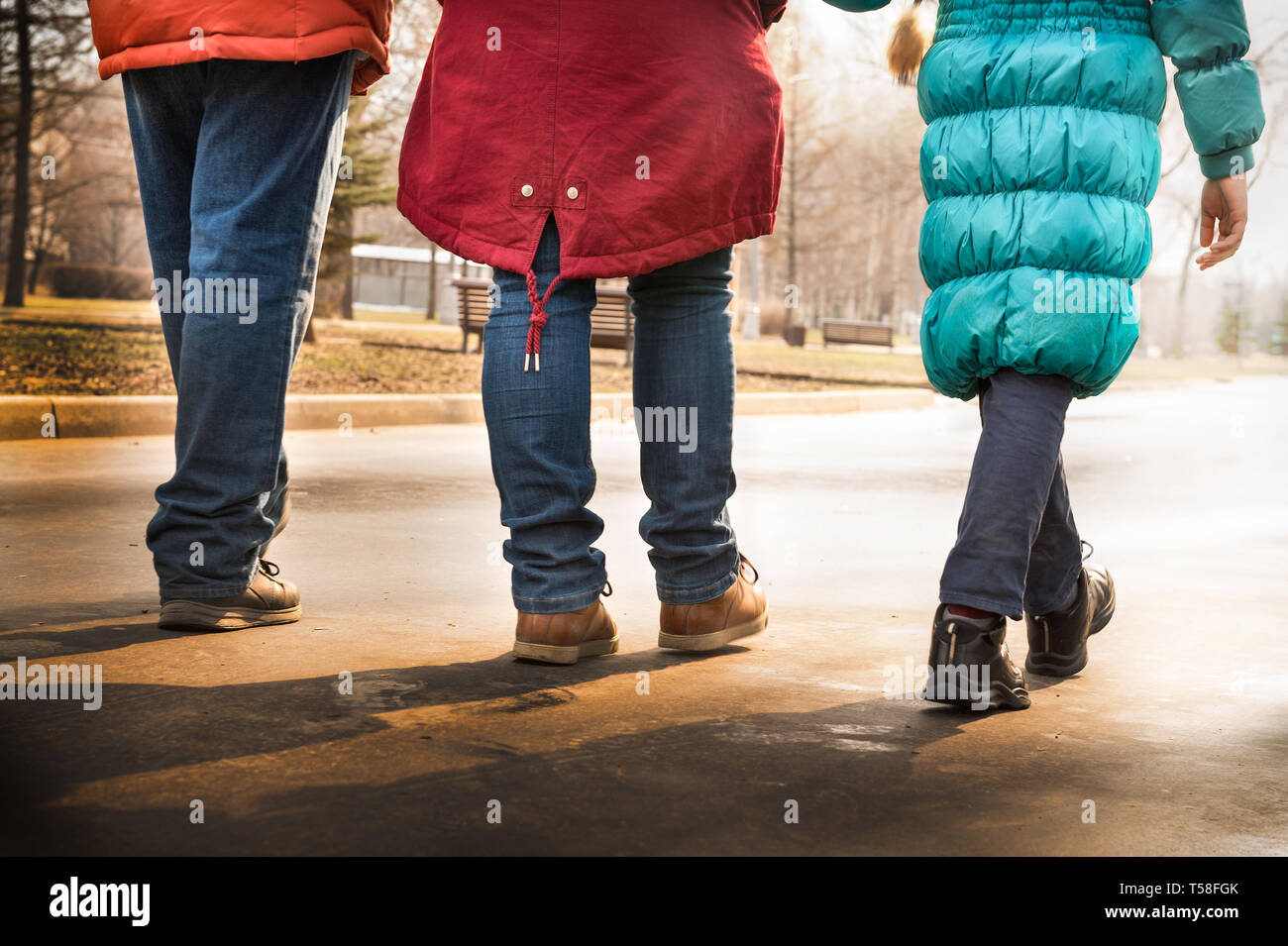 Child parents back view walking hi-res stock photography and images - Alamy