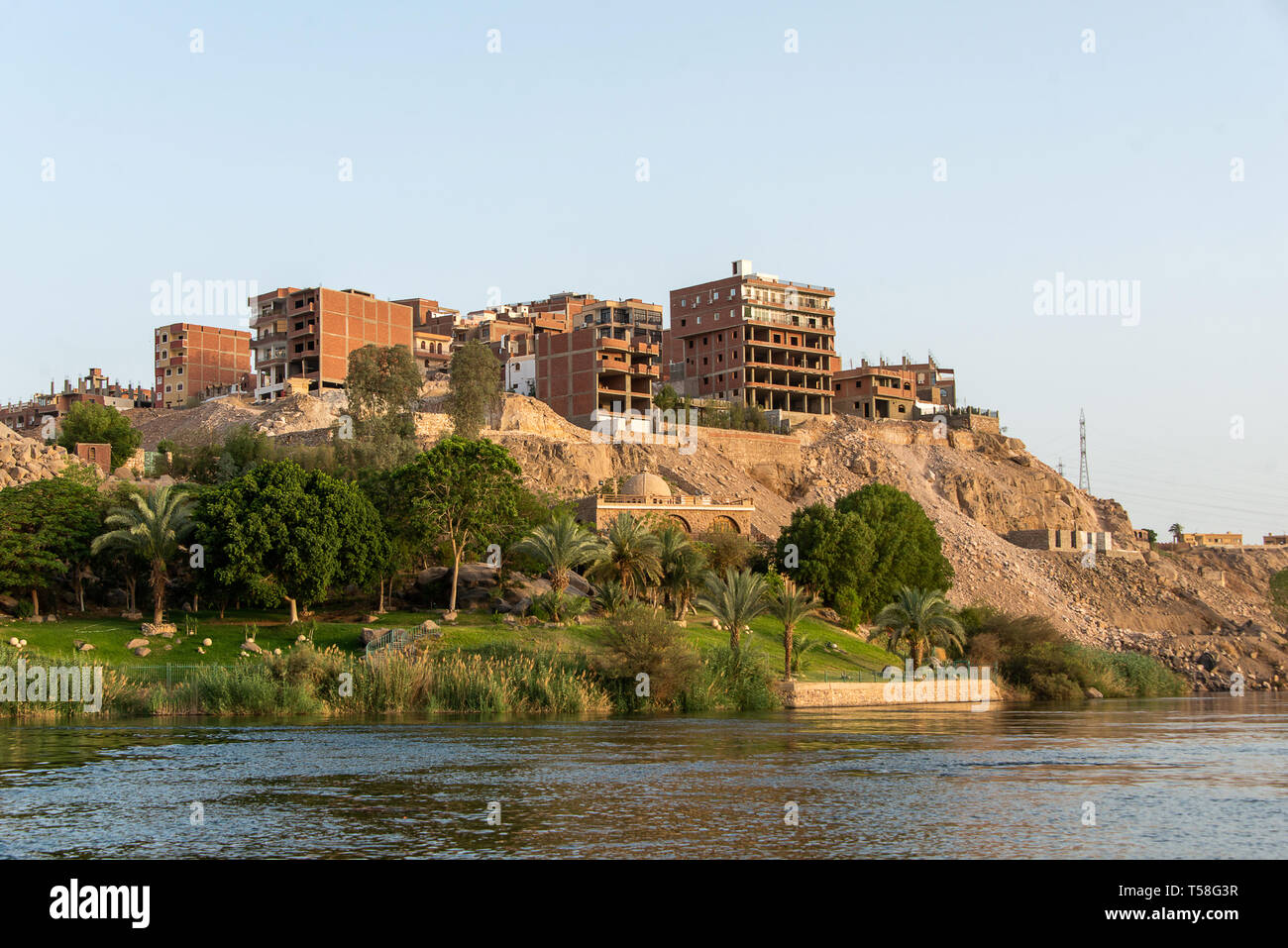 Aswan city Egypt panorama view from a boat on the west coast of the ...