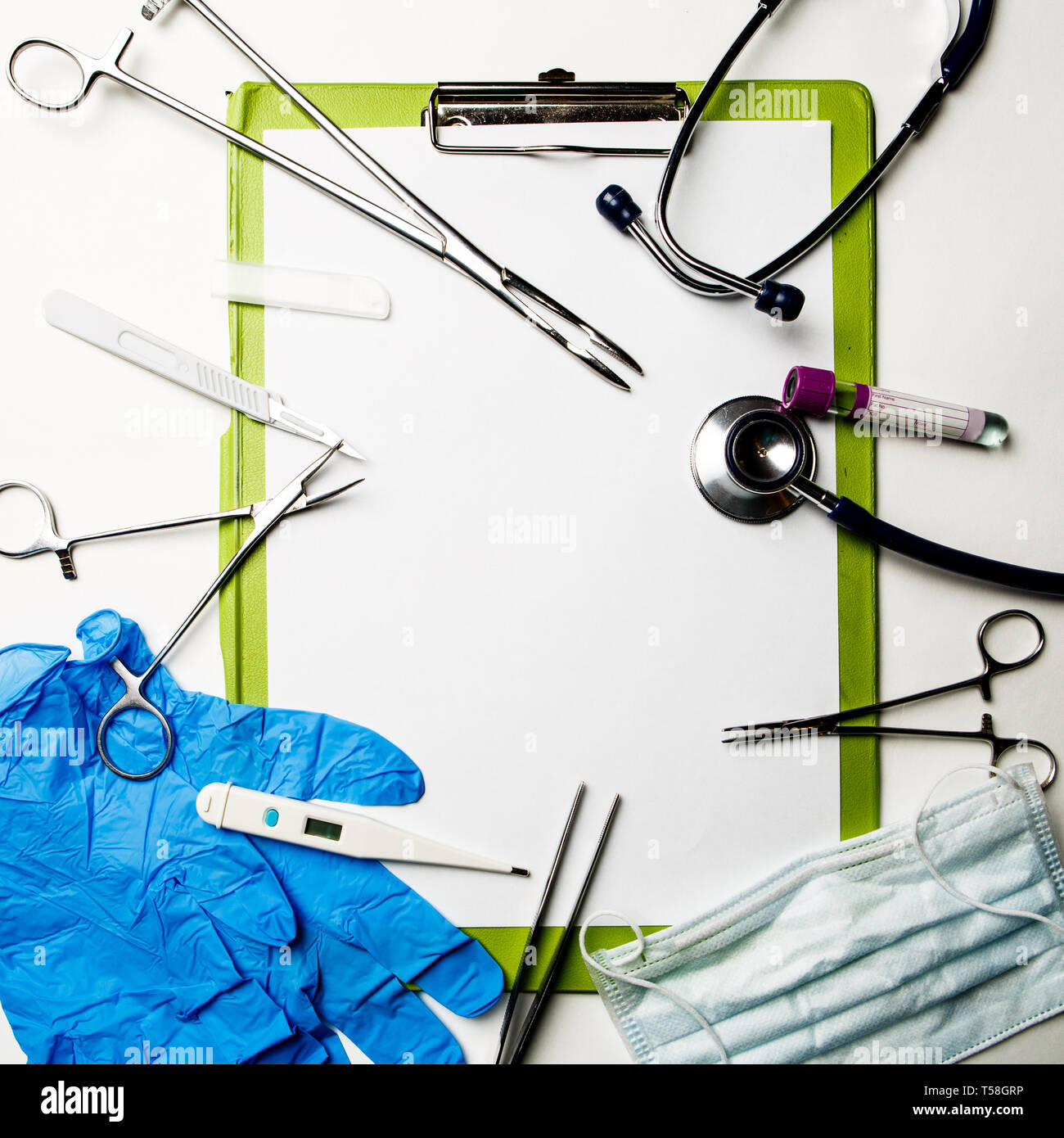 Doctor tools on blue surface Stock Photo - Alamy