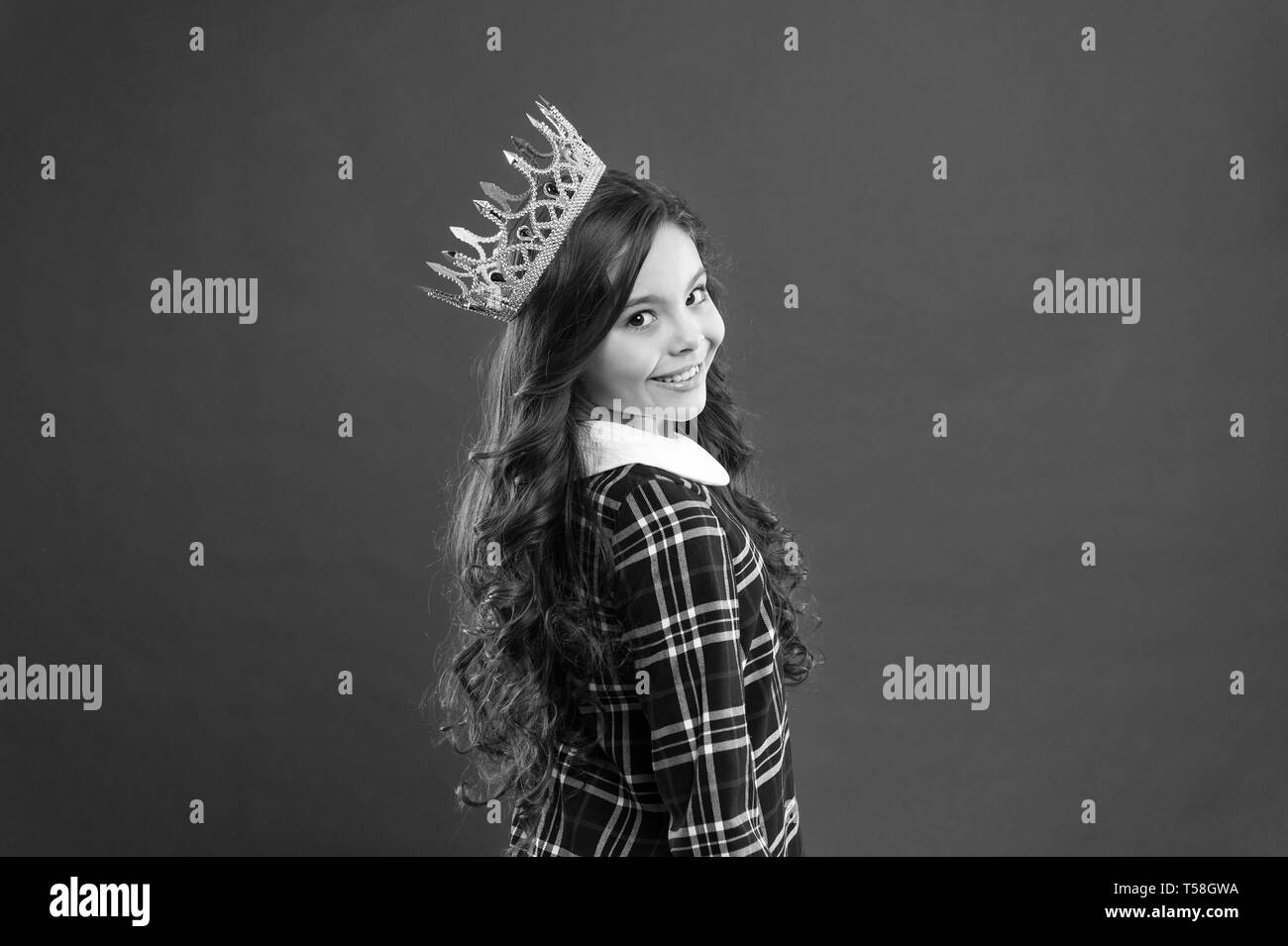 Girl wear crown red background. Spoiled child concept. Egocentric ...