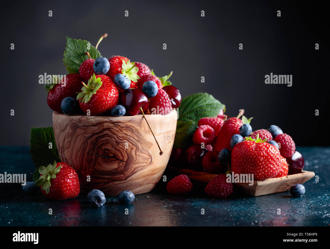 Colorful assorted mix of strawberry, blueberry, raspberry and sweet ...