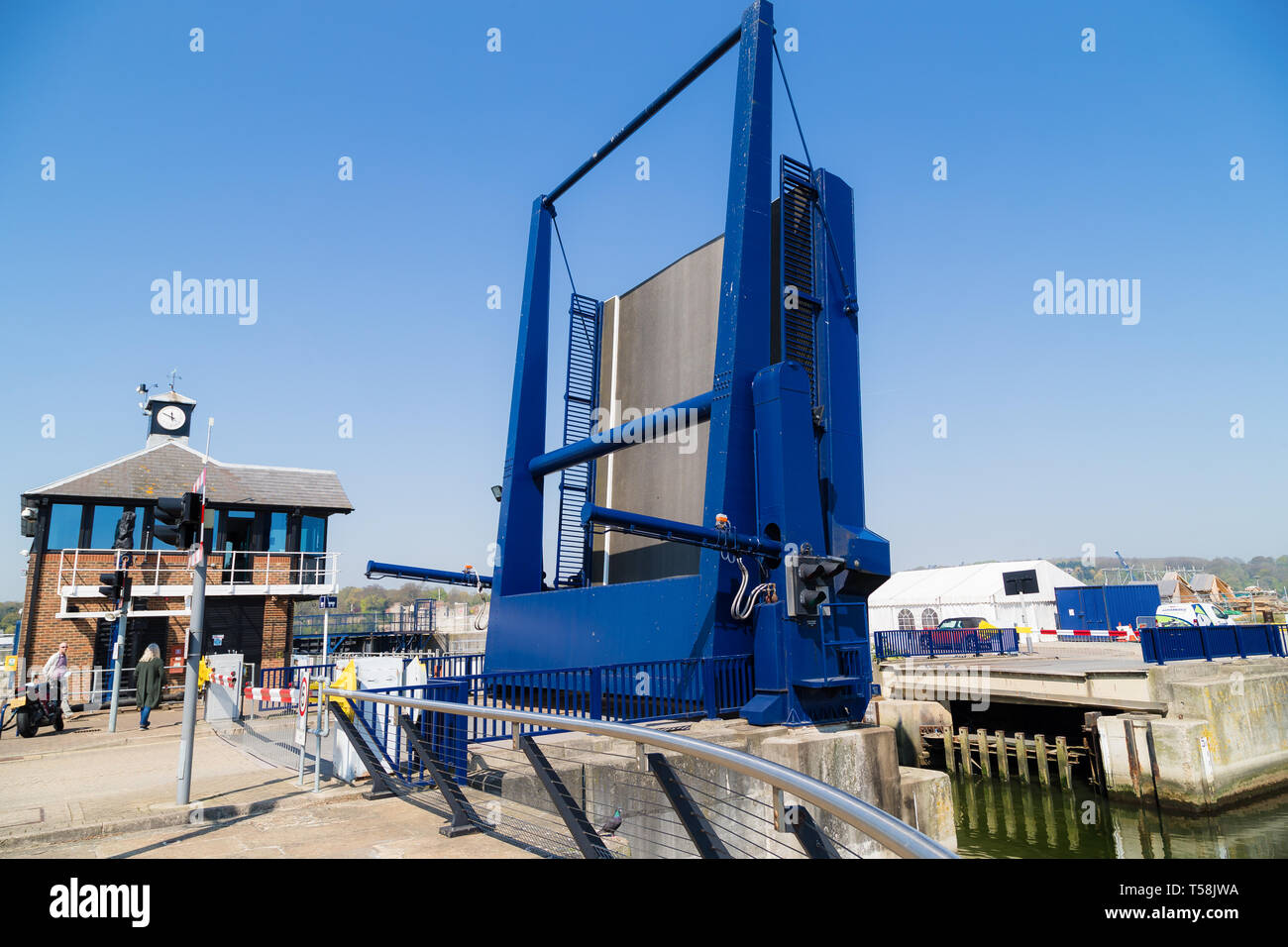 Chatham Maritime Marina bascule bridge and lock. The bridge opening to ...