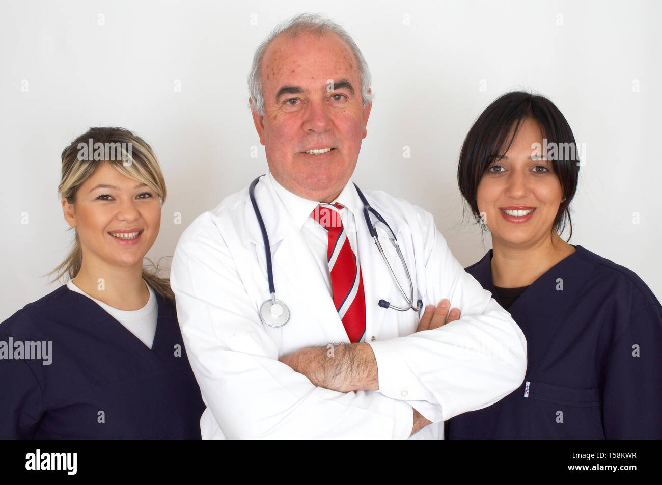happy doctors team together on white background Stock Photo - Alamy