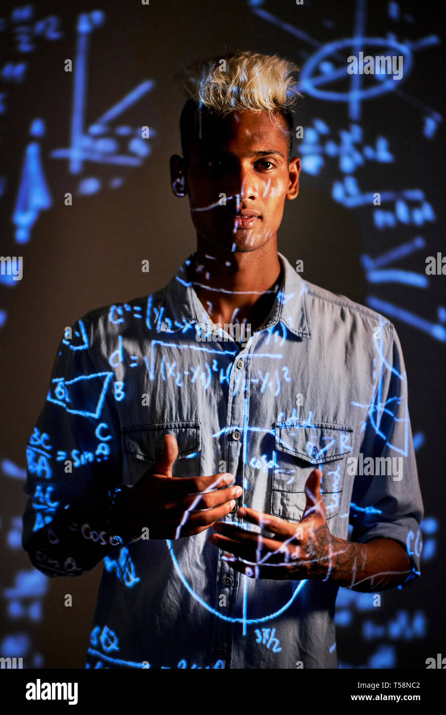 Young mathematician telling about new formula Stock Photo - Alamy
