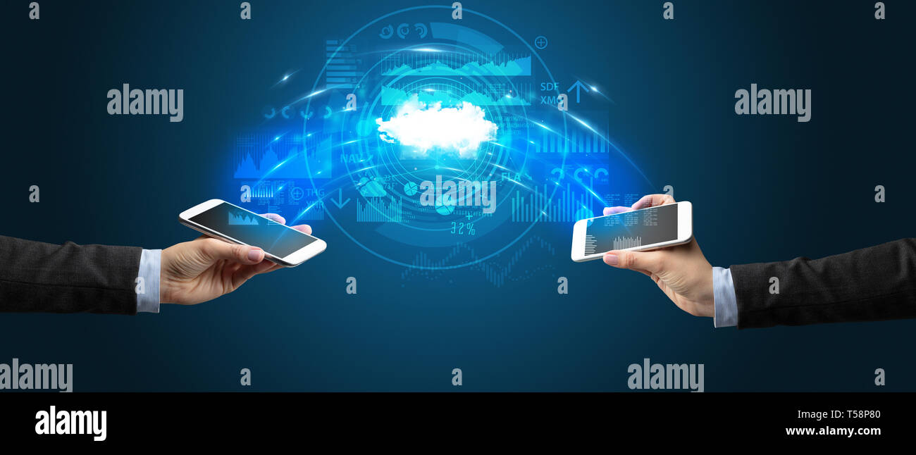 Two mobile phones syncing through the cloud Stock Photo - Alamy