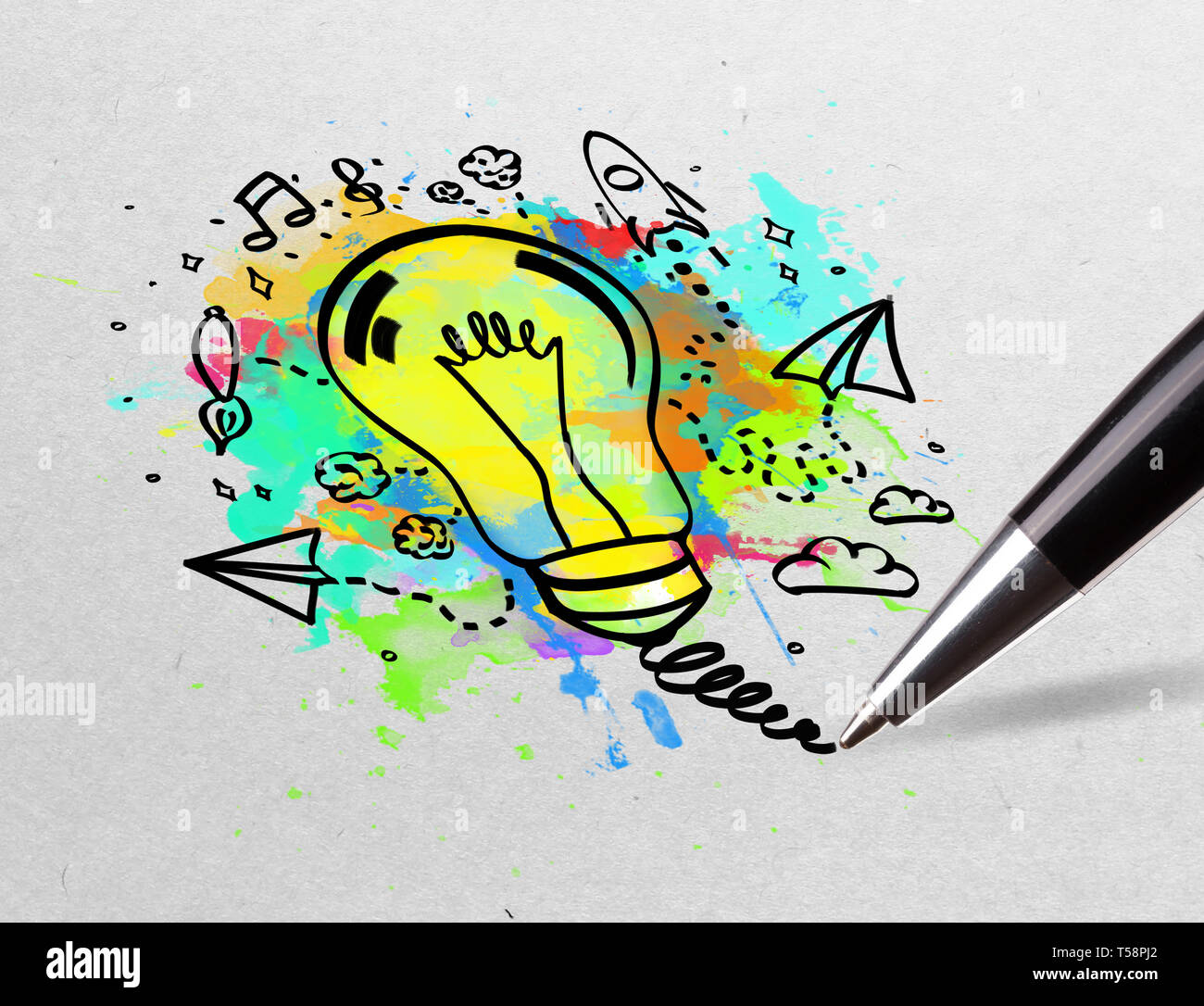 Drawing colorful bulb and multimedia symbols on white paper Stock Photo ...