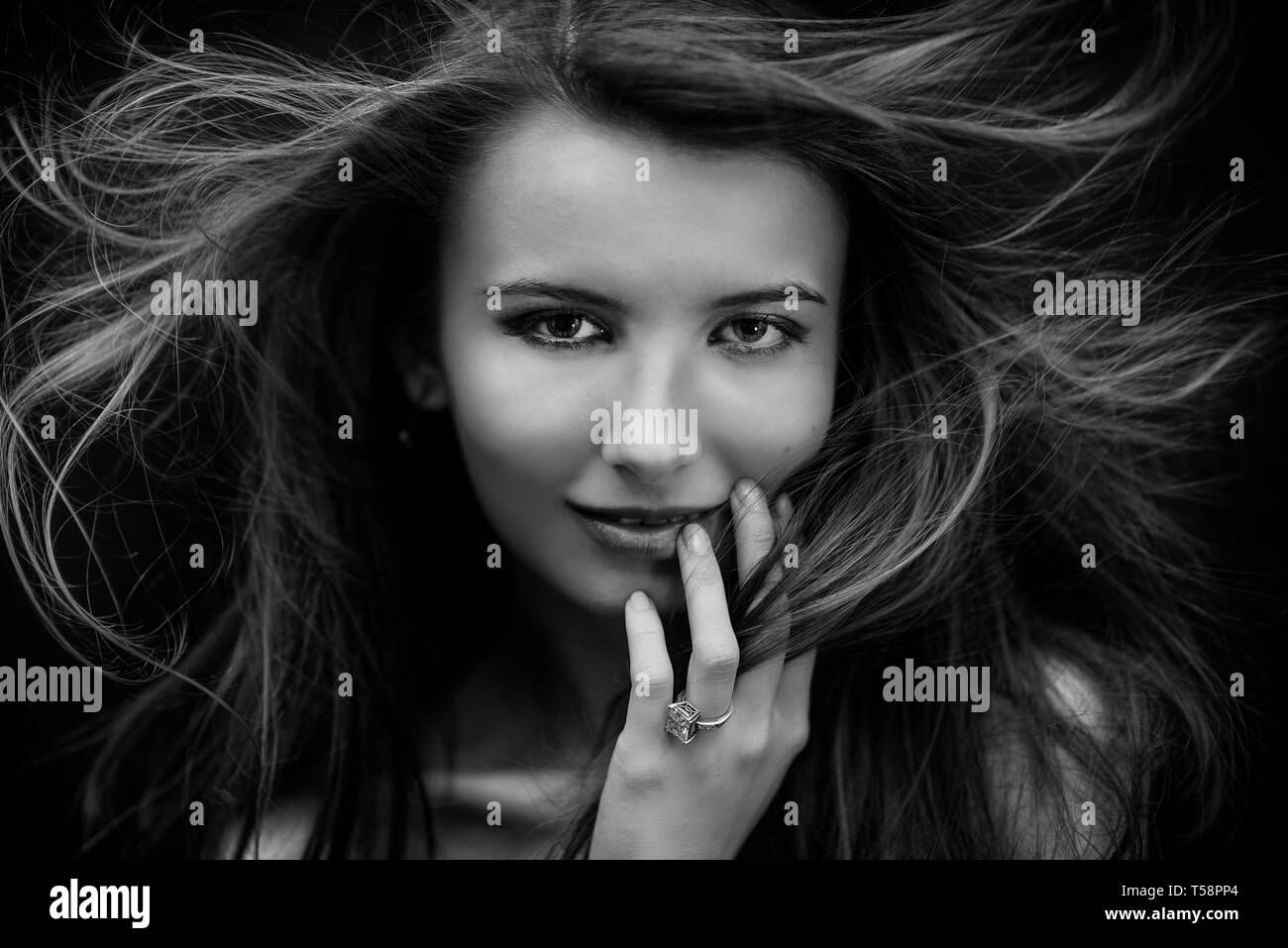 Woman, hair blowing in wind Black and White Stock Photos & Images - Alamy