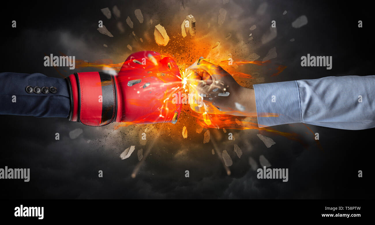 Two hands fighting and breaking a rock into small pieces Stock Photo ...