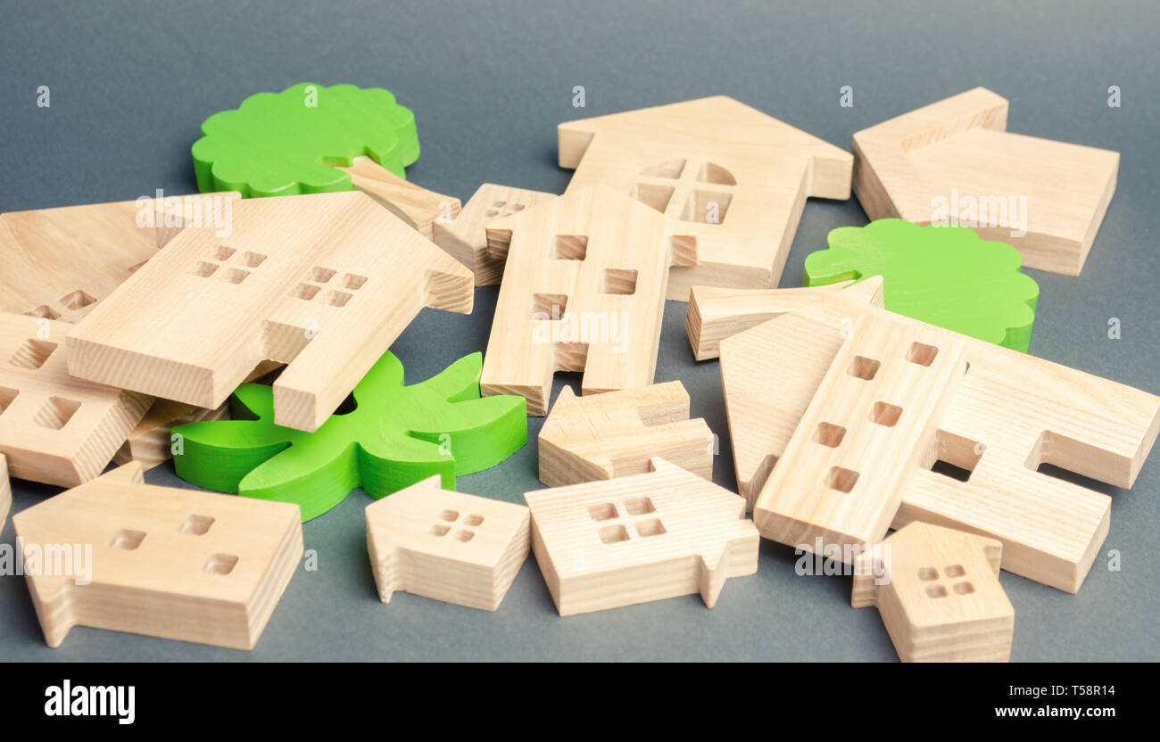 Many felled wooden houses. Destruction of houses as a result of natural ...