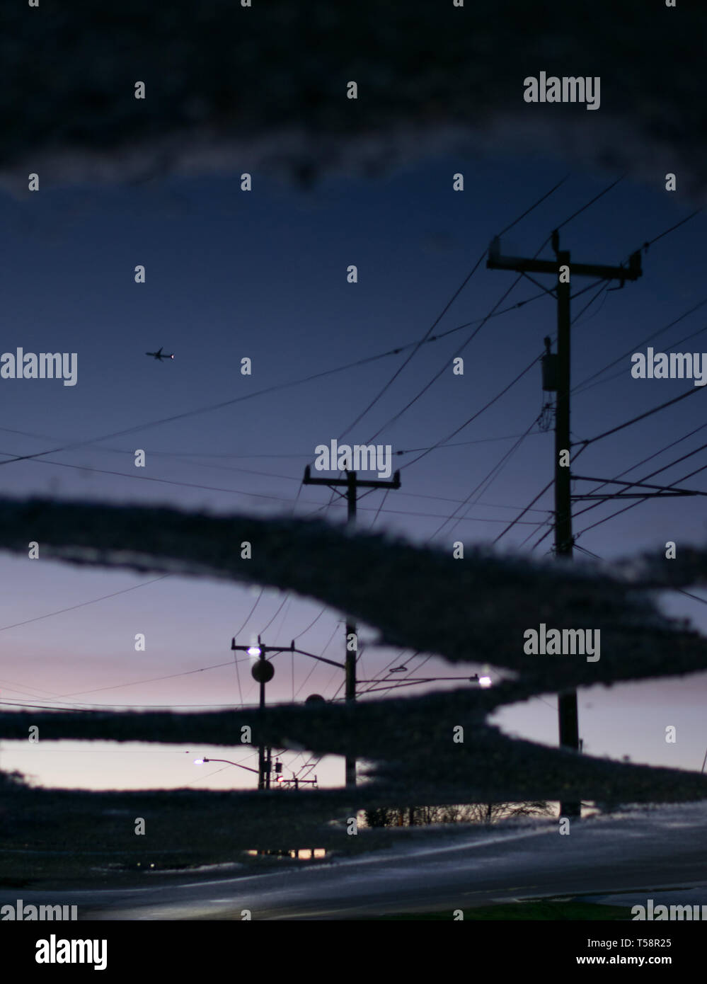 Abstract upside down surrealism in puddle reflection Stock Photo - Alamy