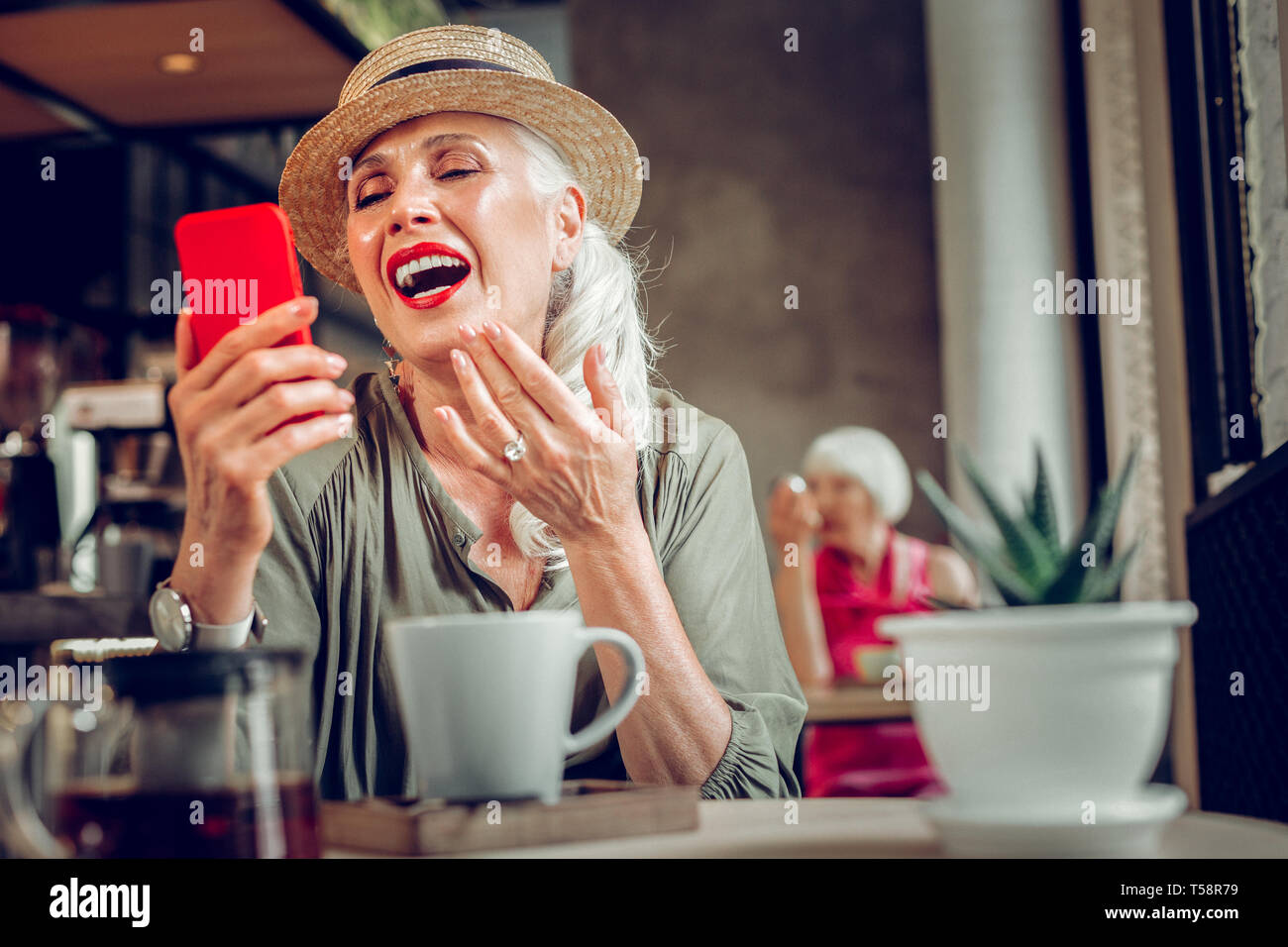 Happy nice positive woman being in a great mood Stock Photo - Alamy