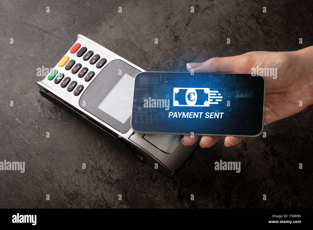 Hand paying with digital currency from smartphone Stock Photo - Alamy