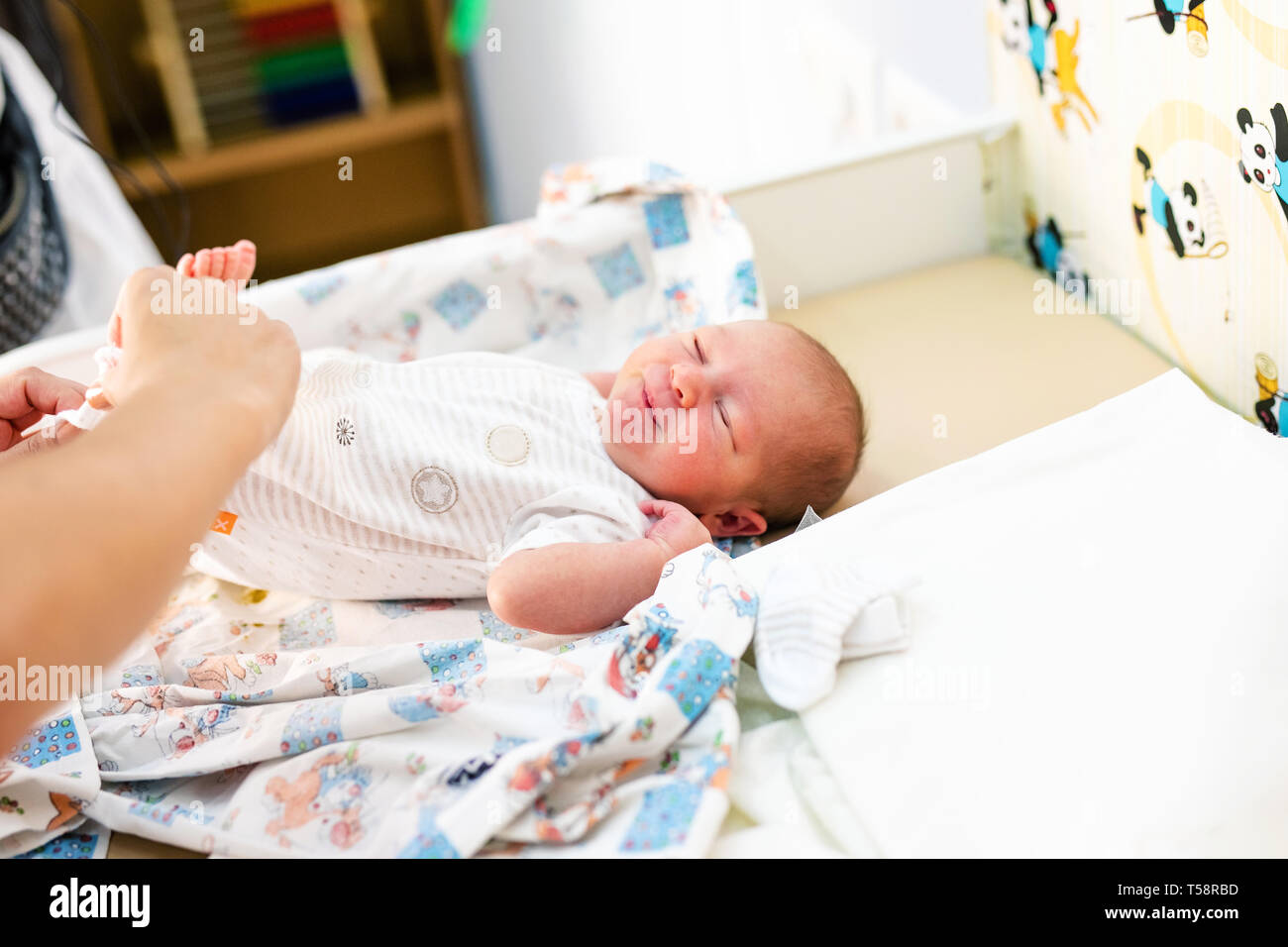 Newborn baby. Little child in medicine hospital. Medical health care ...