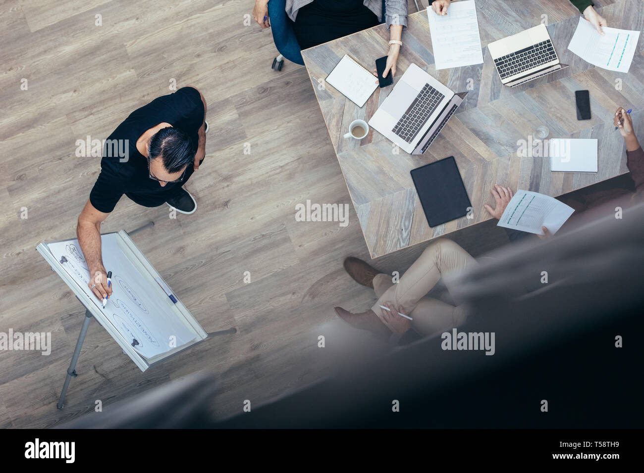 Business meeting room with flipchart hi-res stock photography and ...