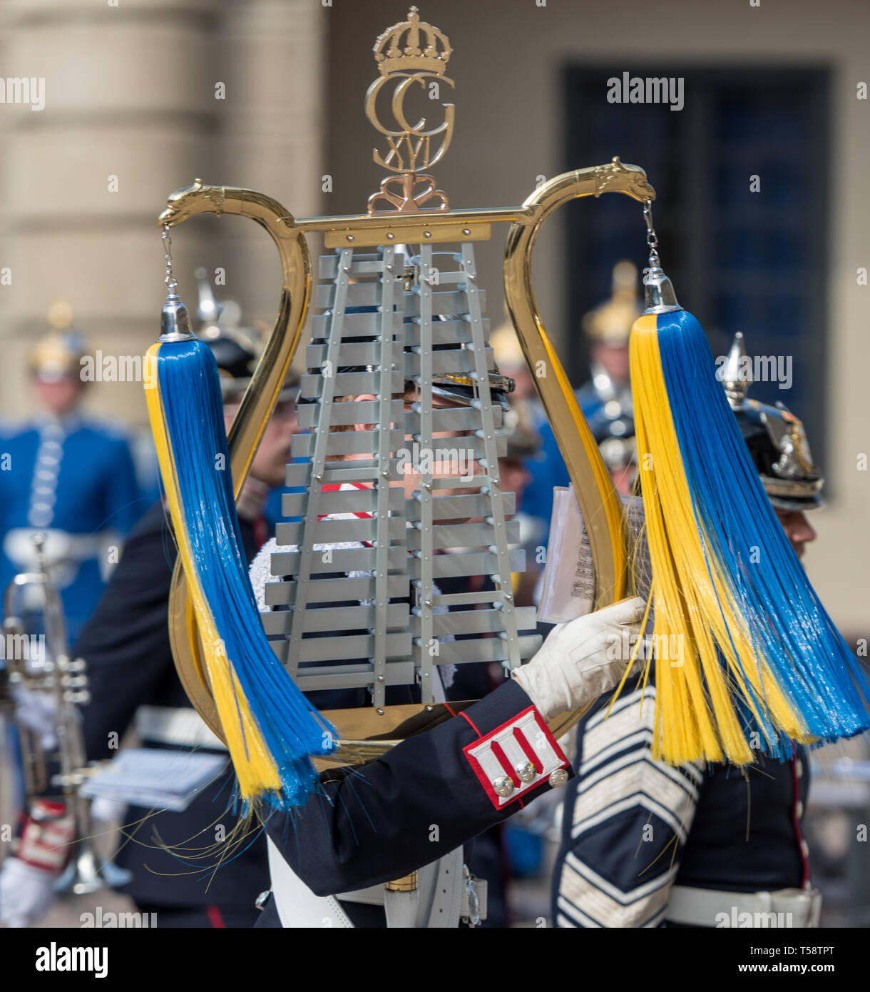 A member of the Royal Swedish Army Band plays an ornate bell lyre ...