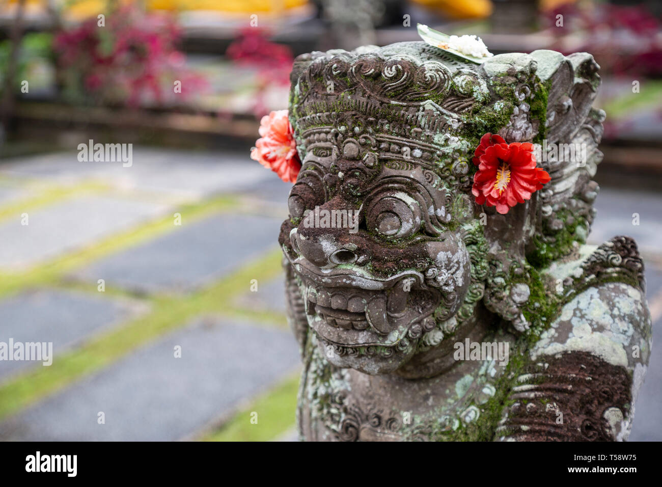 Mossy Sculpture in a Temple in Bali, Indonesia Stock Photo - Alamy