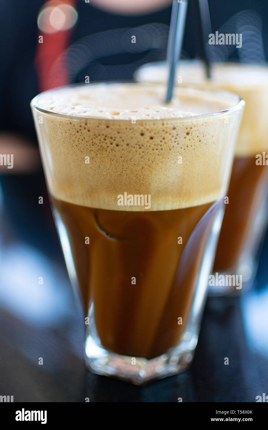 Traditional greek cold coffee Frappe with foam made from water, instant ...