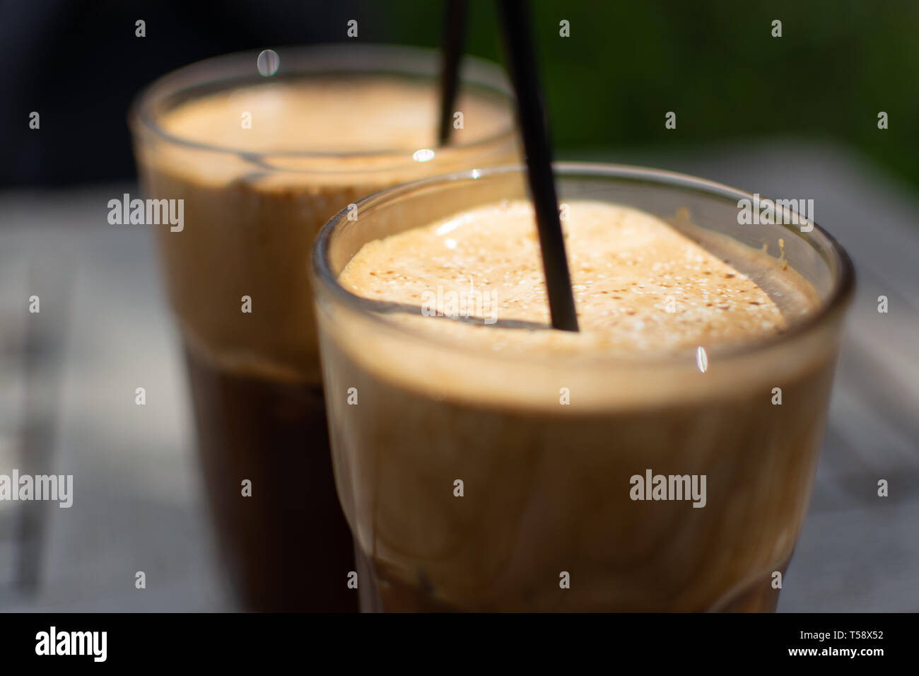 Traditional greek cold coffee Frappe with foam made from water, instant ...