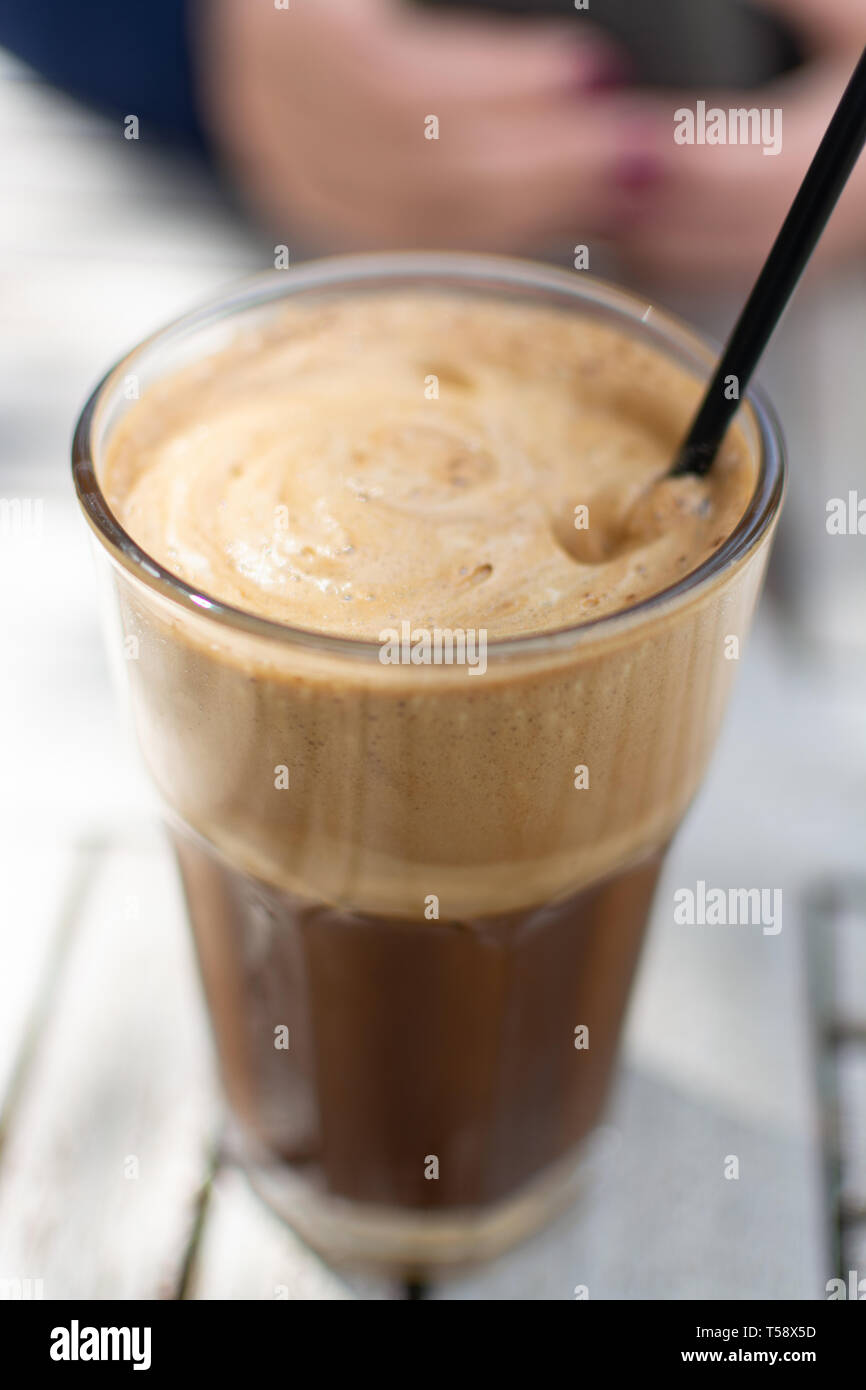 Traditional greek cold coffee Frappe with foam made from water, instant ...