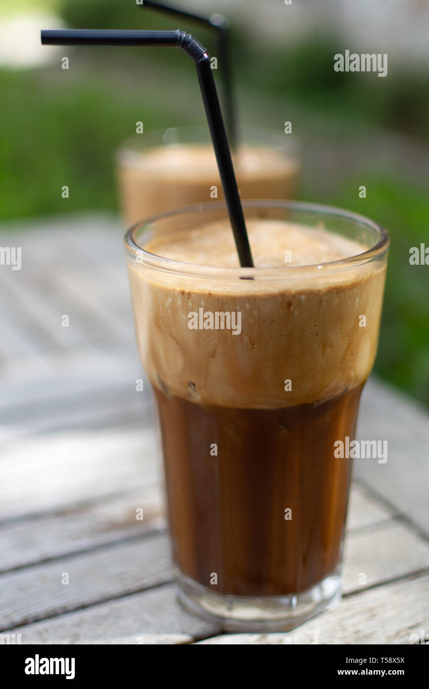 Traditional greek cold coffee Frappe with foam made from water, instant ...