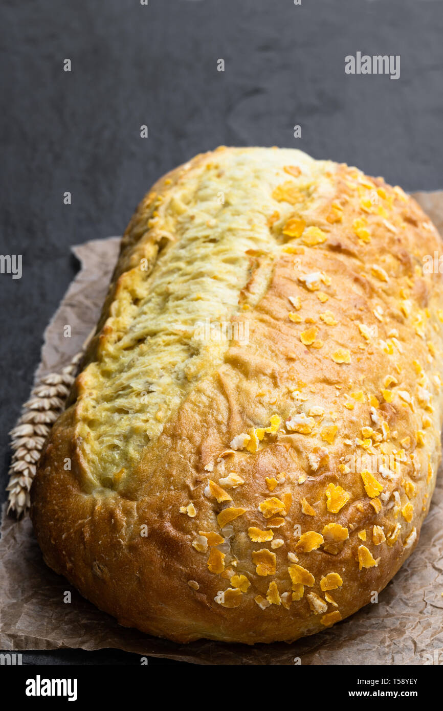 Homemade corn loaf on black stone background Stock Photo - Alamy
