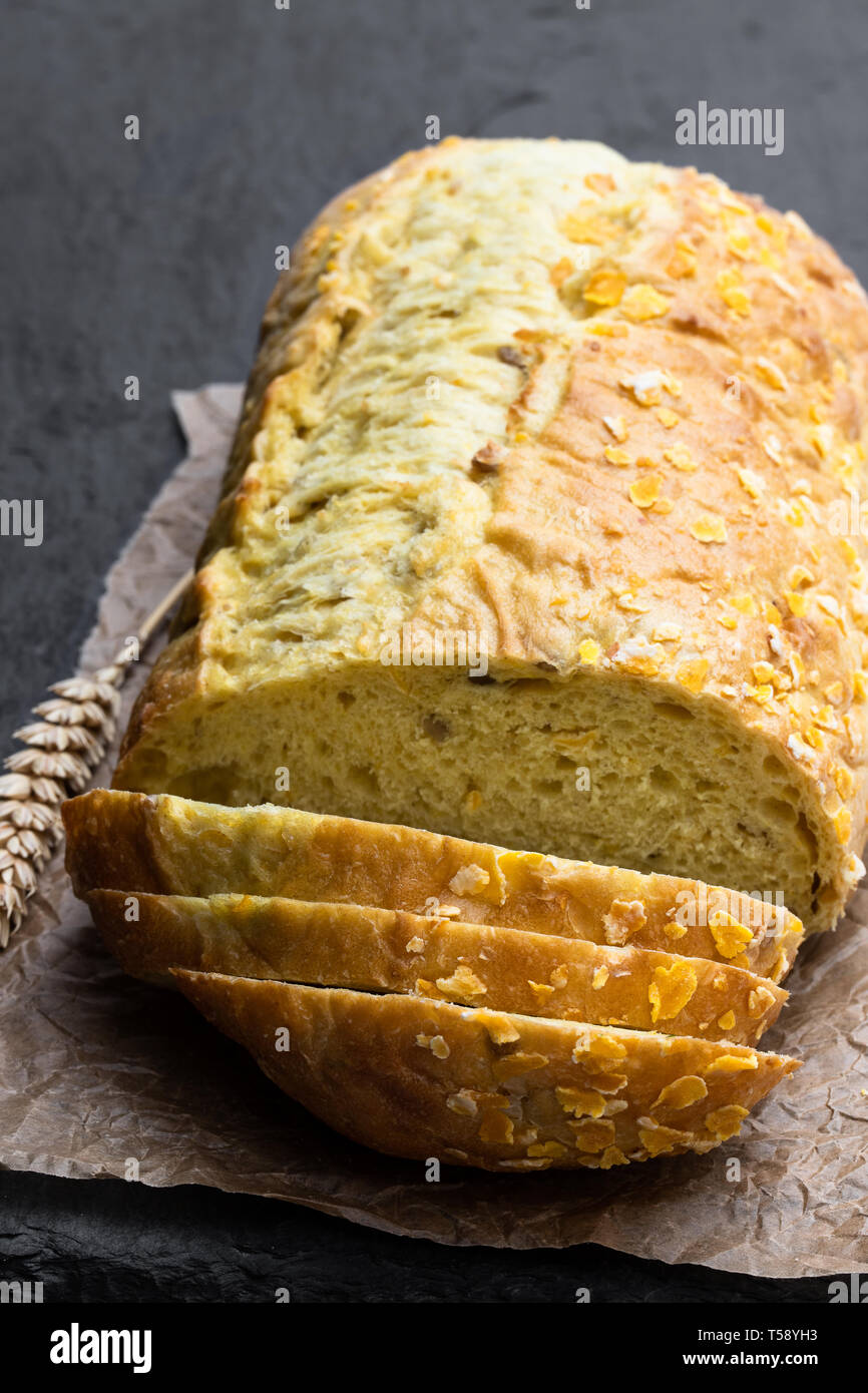Homemade corn loaf on black stone background Stock Photo - Alamy