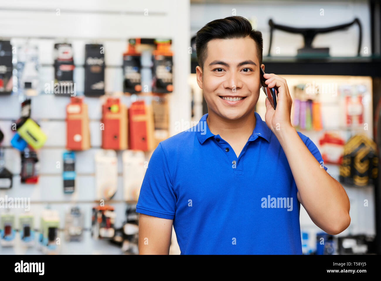 Salesman talking on the phone Stock Photo - Alamy
