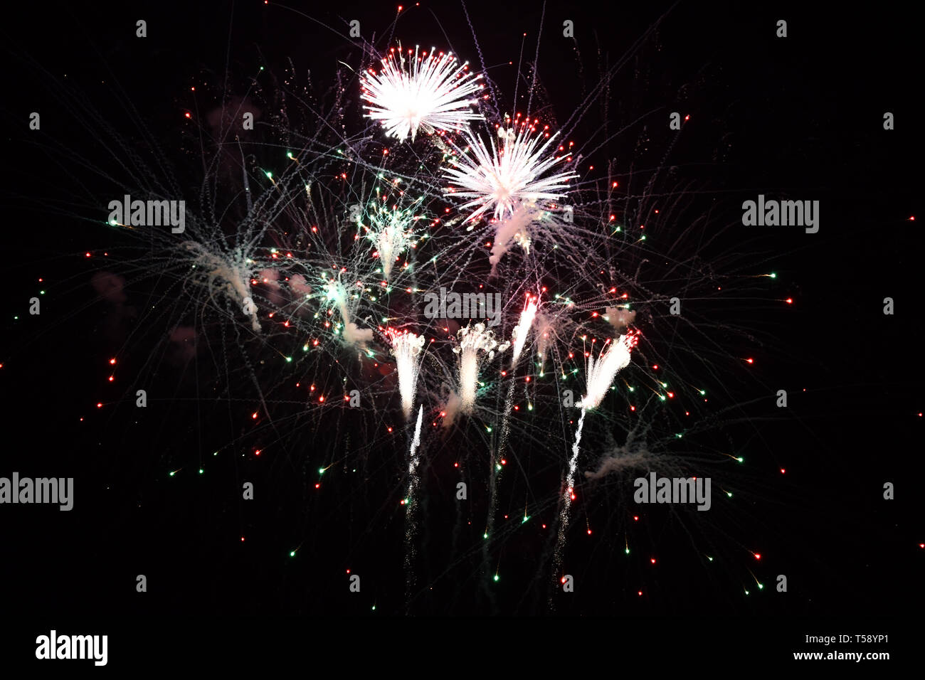 colorful fireworks in sky explode Stock Photo - Alamy