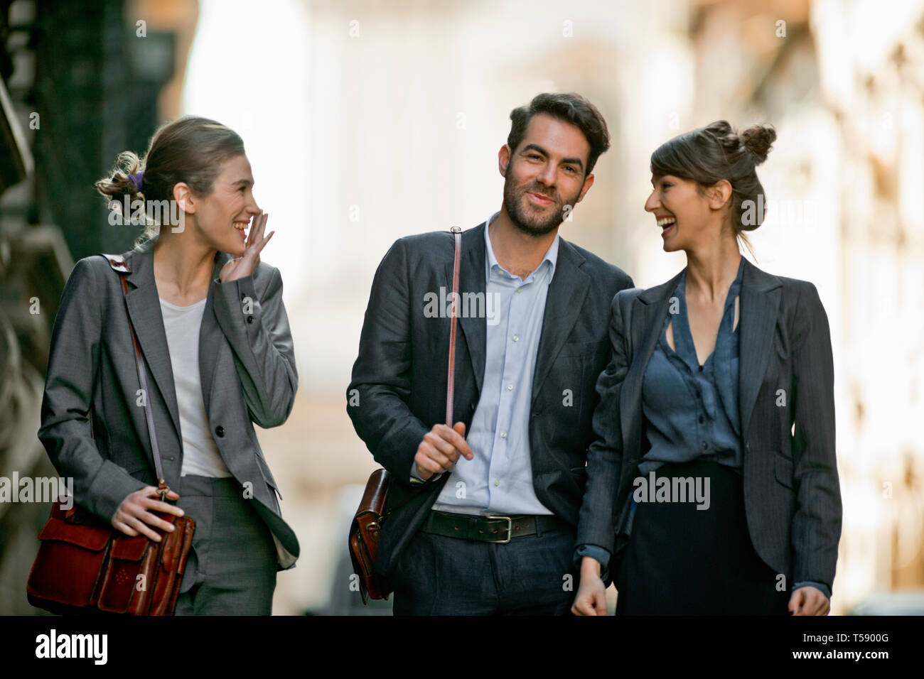 Male colleagues walk hi-res stock photography and images - Alamy