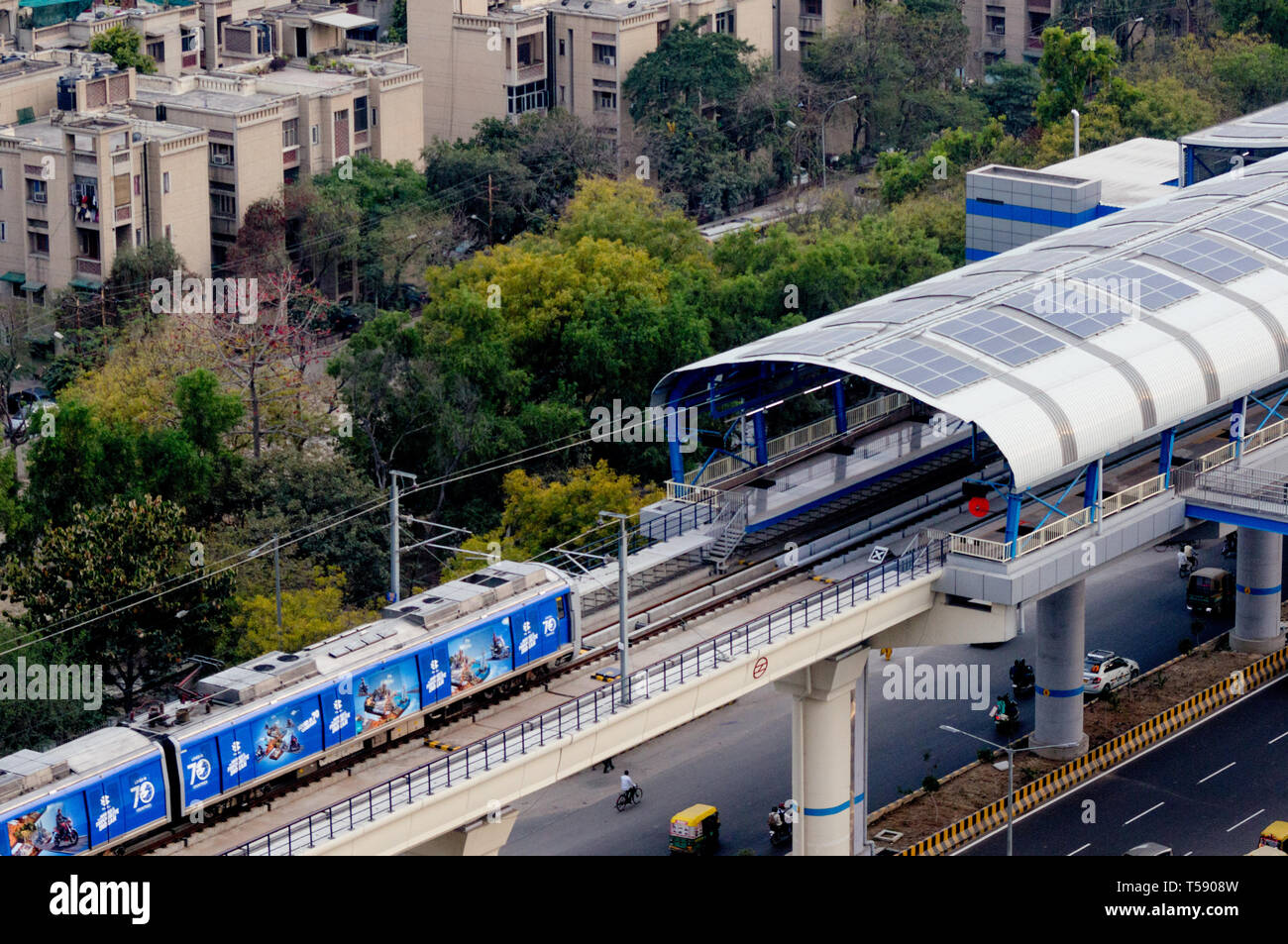 Aerial shot of metro train arriving at an elevated metro station Stock ...