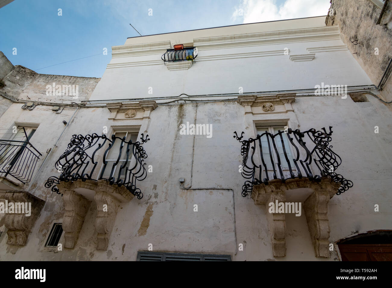 Beautiful facade of building in Puglia. Mediterranean architecture of ...