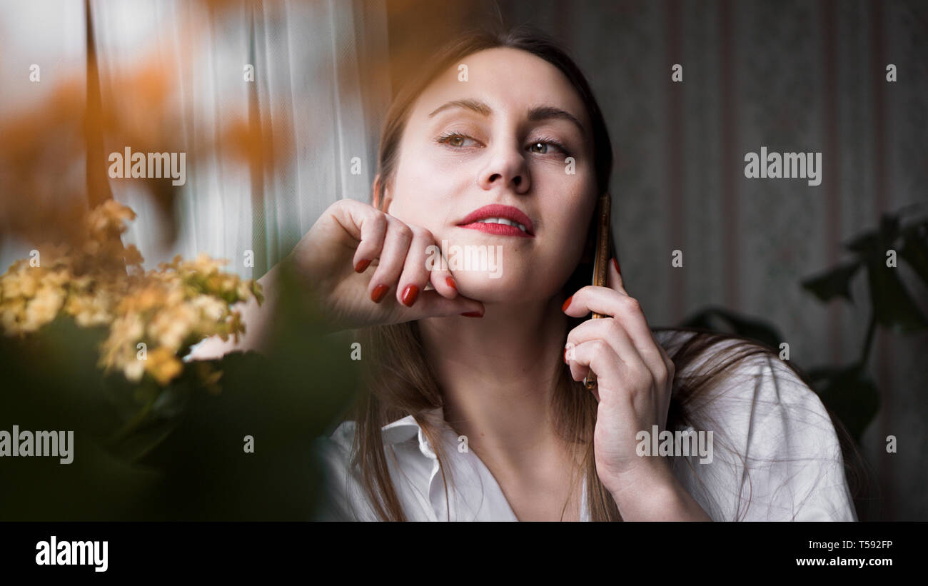 Girl talking on smartphone lips hi-res stock photography and images - Alamy