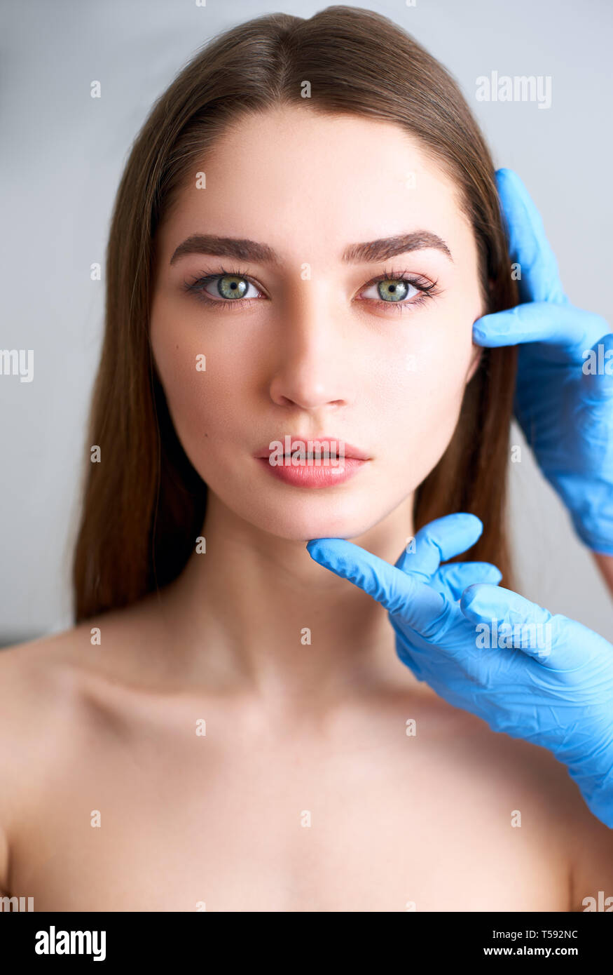 Hands touching face hi-res stock photography and images - Alamy