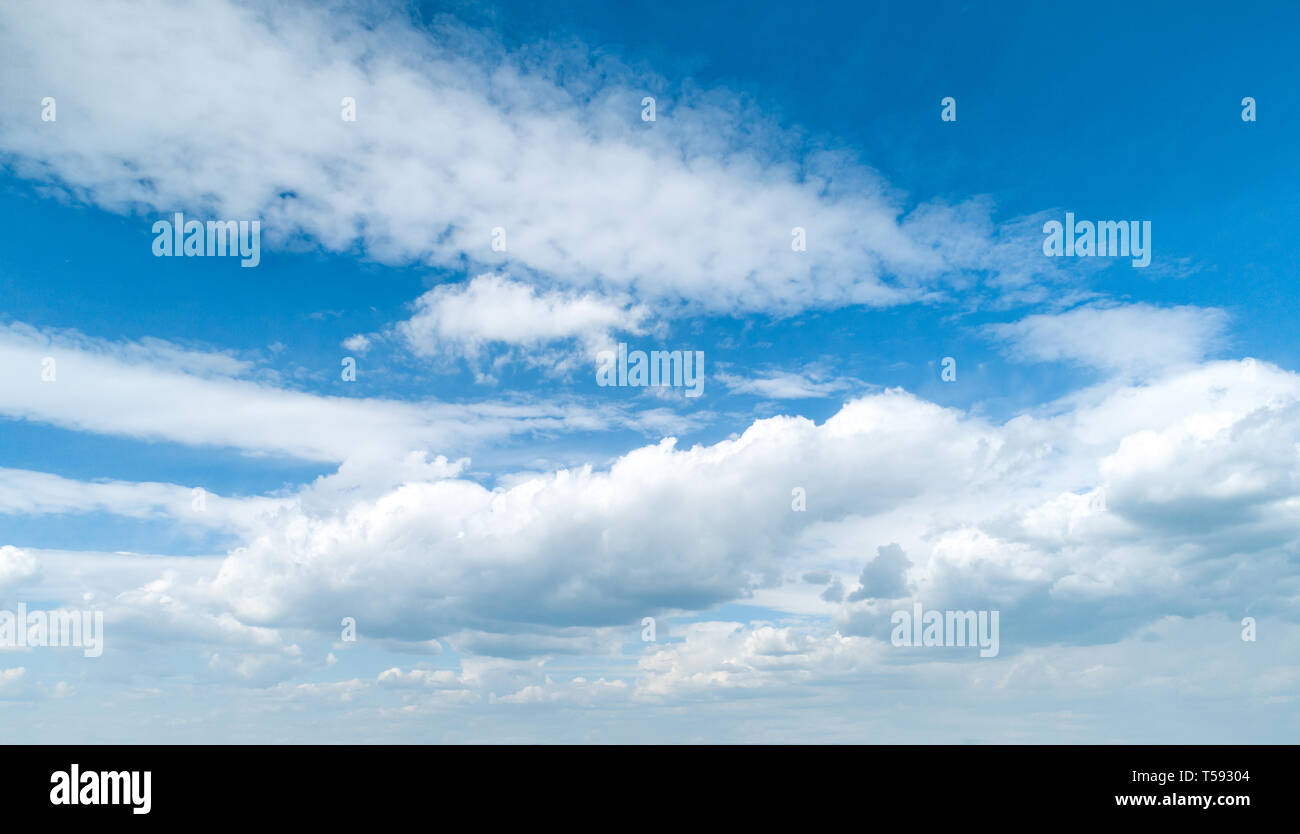 Blue sky with white clouds Stock Photo - Alamy