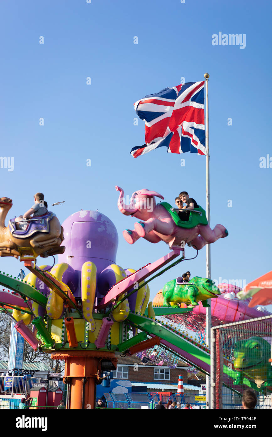 Funfair ride at Littlehampton amusement park in England on a summers ...
