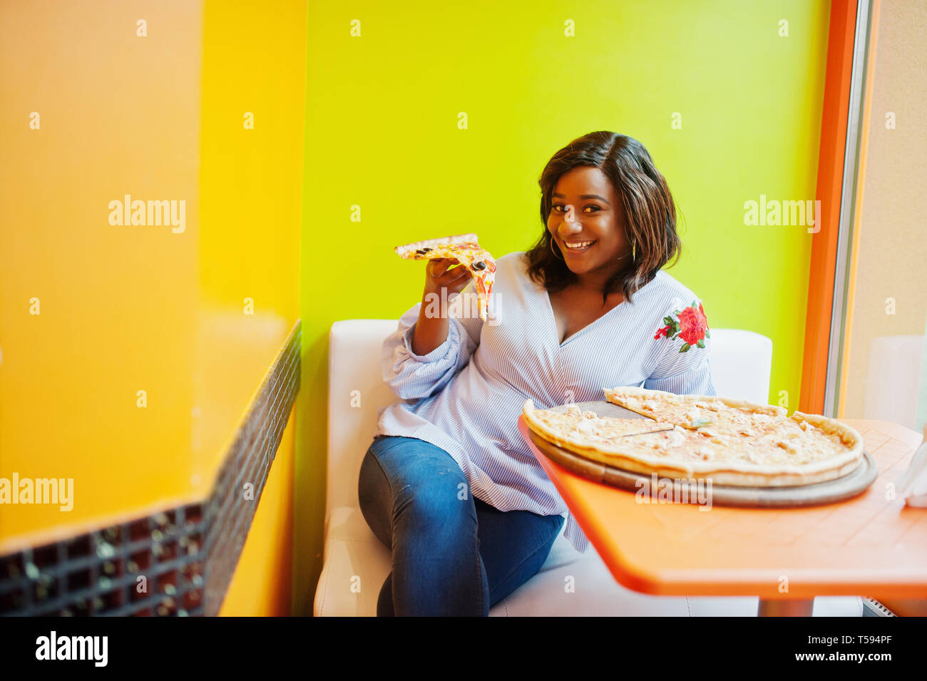 African american slice of pizza hi-res stock photography and images - Alamy