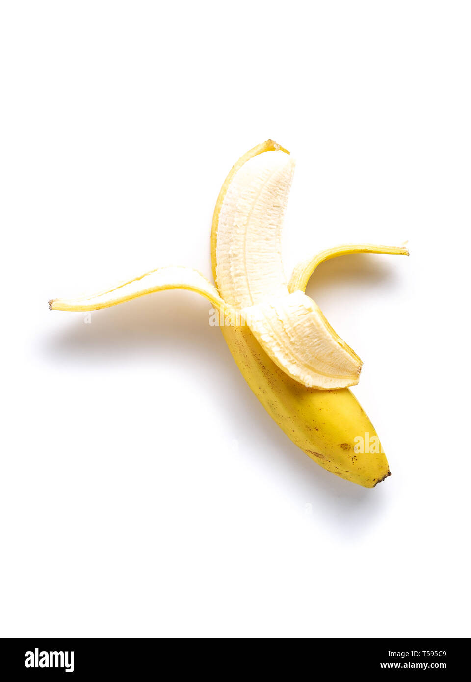 Half peeled ripe banana, isolated on white background Stock Photo - Alamy