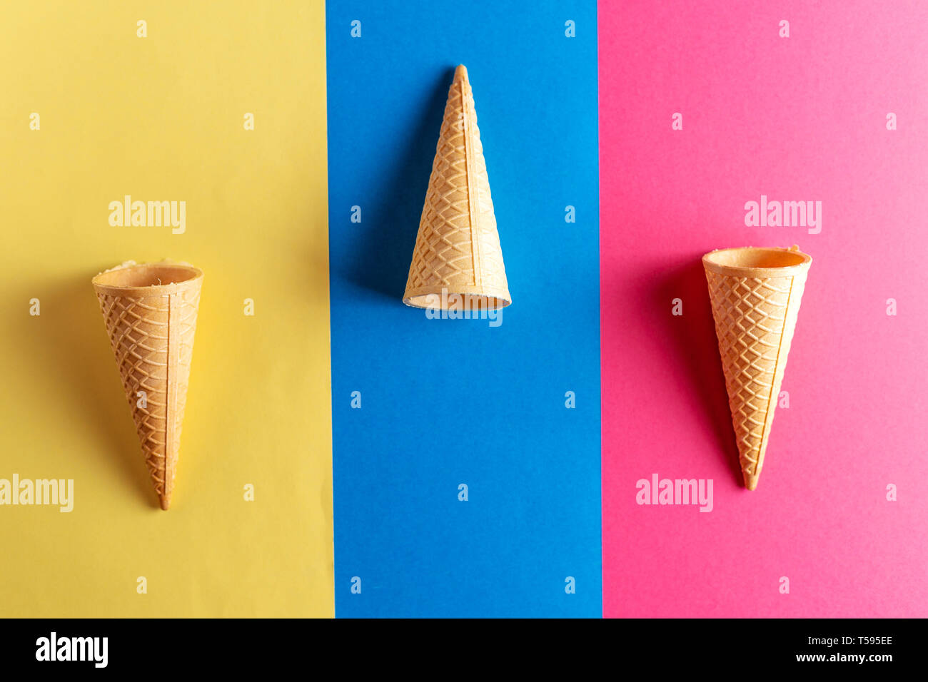 Waffle ice cream cornet on pastel colorful background with place for ...