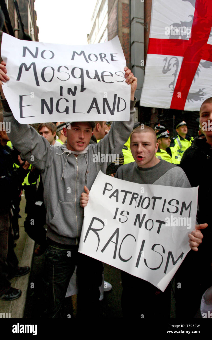 English Defence League march through the streets of Manchester ...