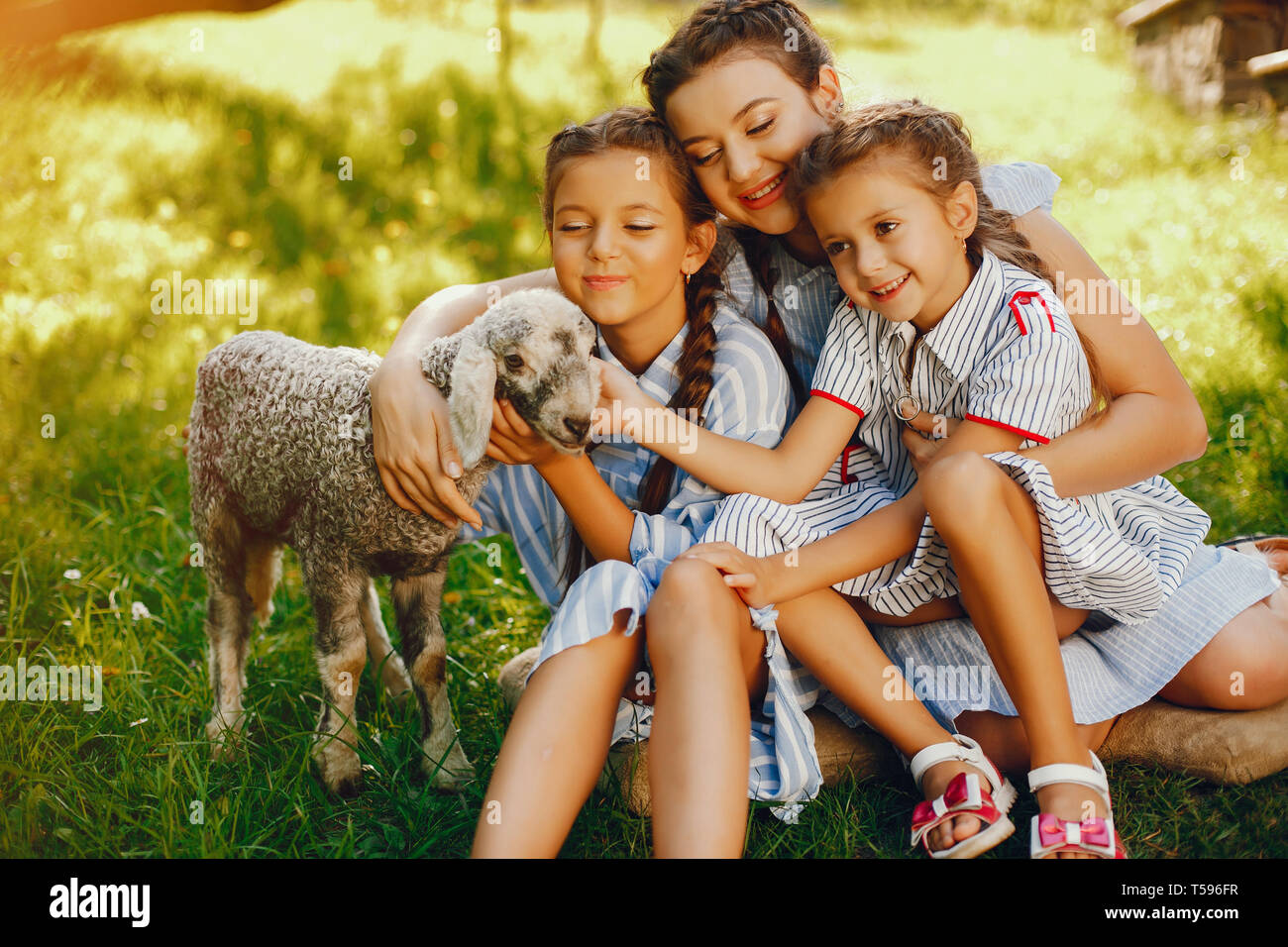 beautiful girl with goat Stock Photo - Alamy