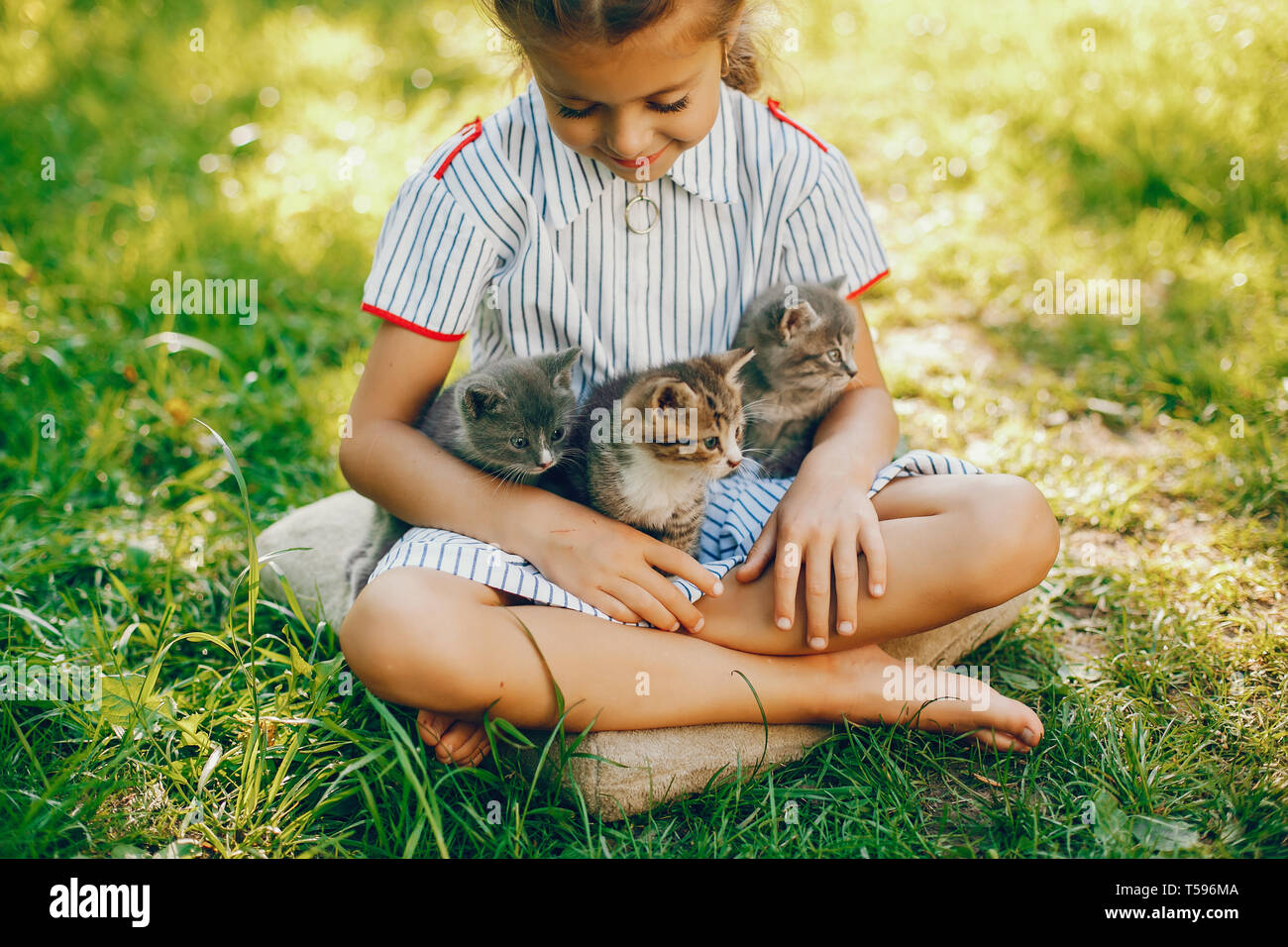 beautiful girl with cats Stock Photo - Alamy