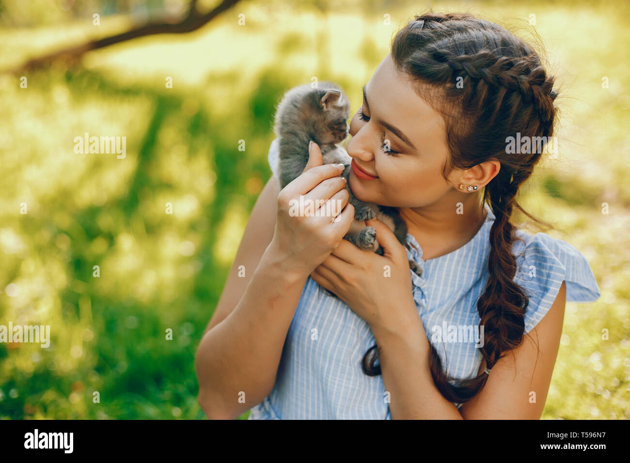 beautiful girl with cats Stock Photo - Alamy
