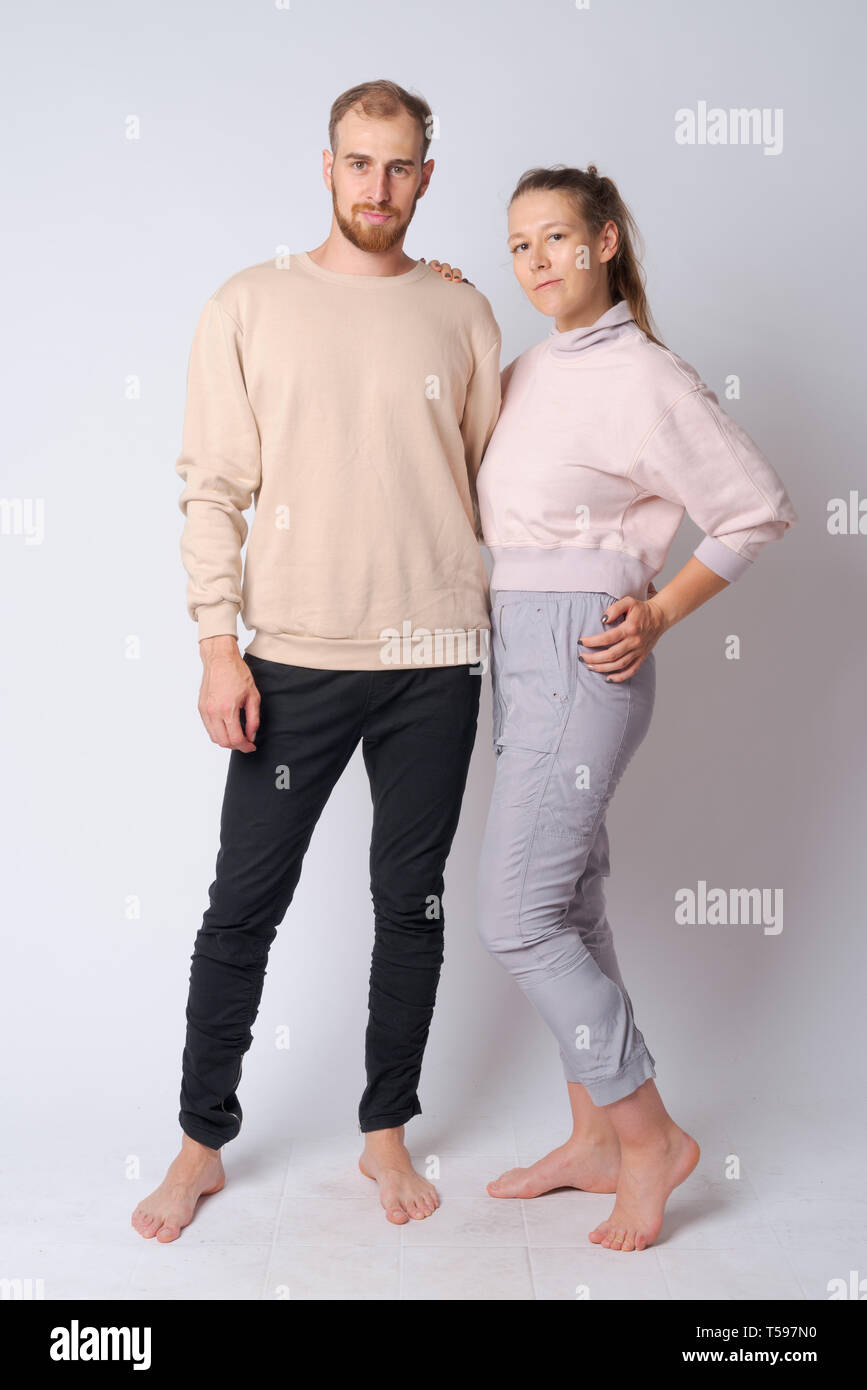 Full body shot of young couple together Stock Photo - Alamy