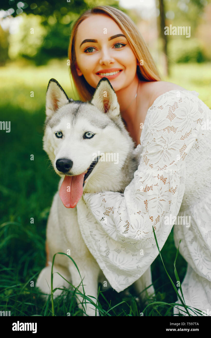 elegant girl with cute dog Stock Photo - Alamy