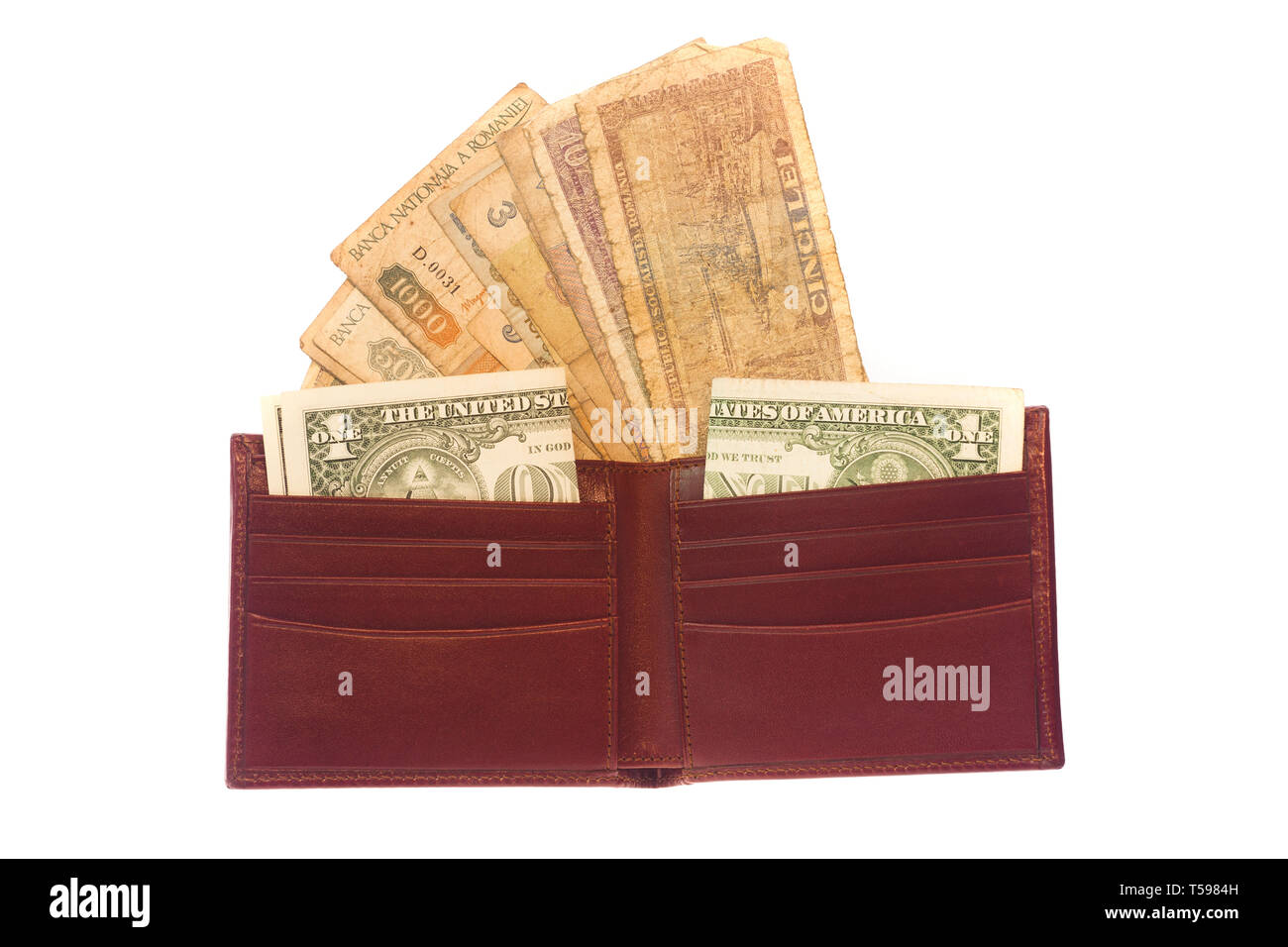 vintage leather wallet full of old money isolated Stock Photo - Alamy