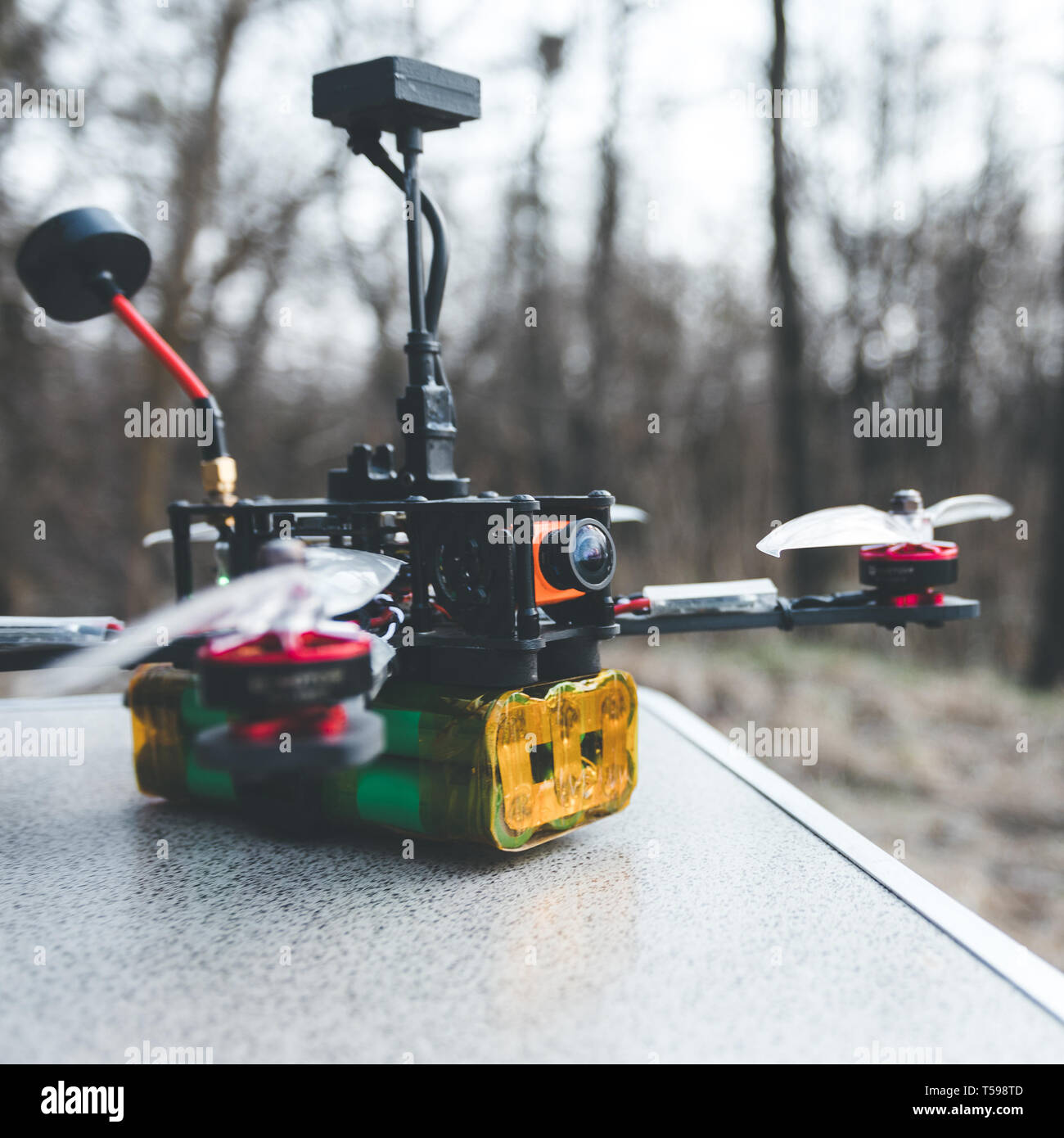 A small self made FPV drone lies on the table before the flight Stock ...