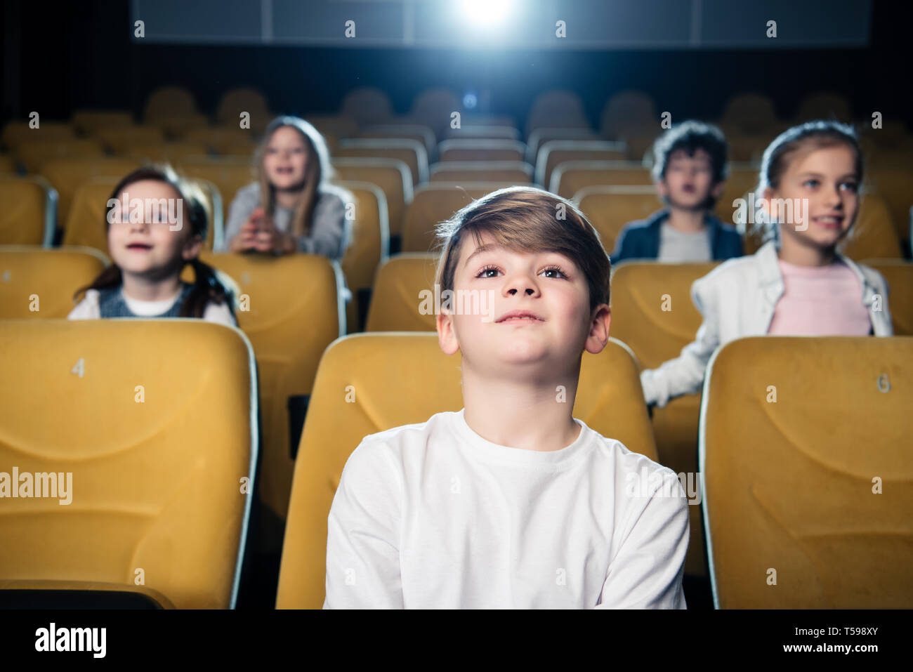 Boys in cinema hall hi-res stock photography and images - Alamy